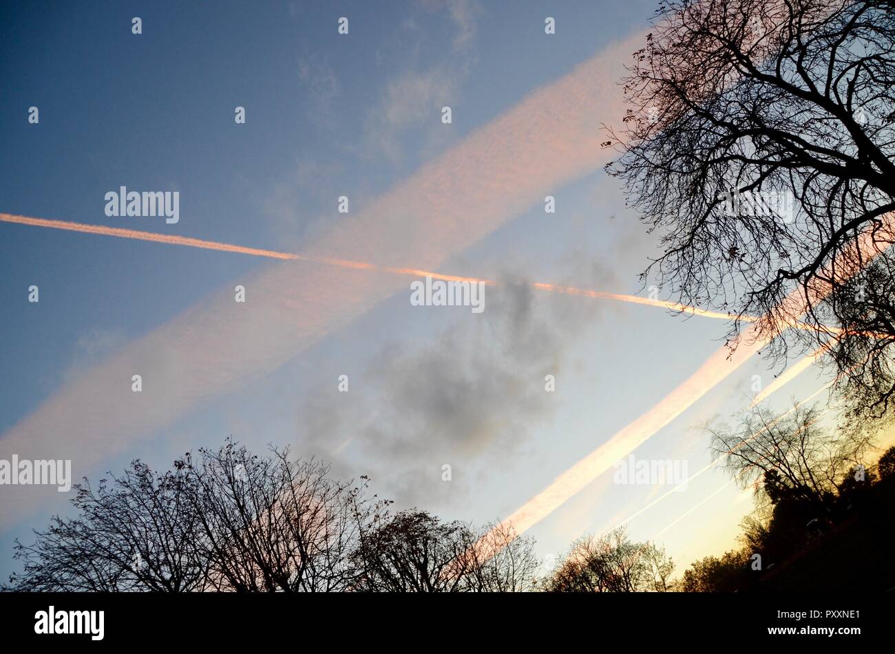 Pink contrail hi-res stock photography and images - Alamy