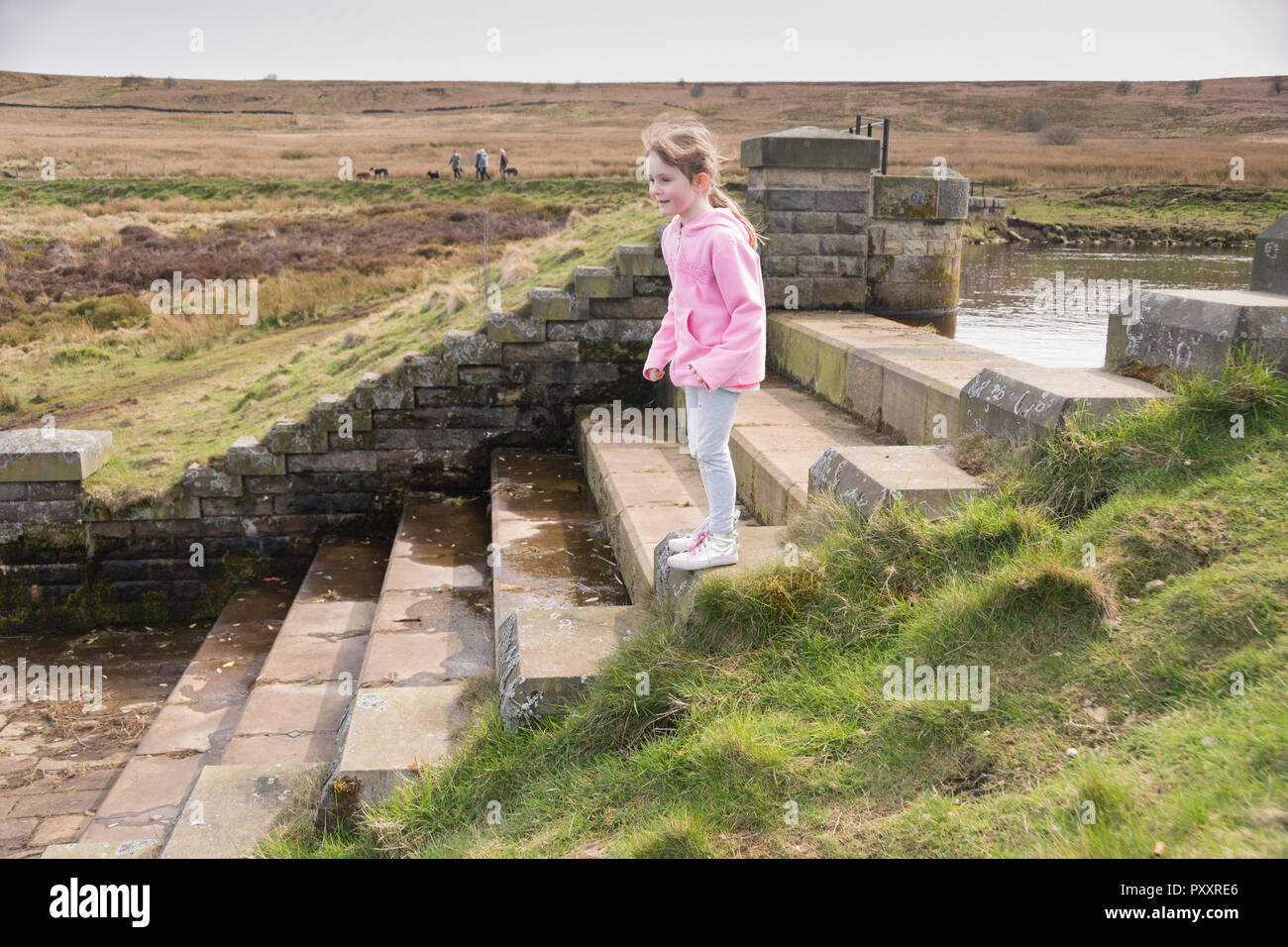 Child walking down steps hi-res stock photography and images - Alamy
