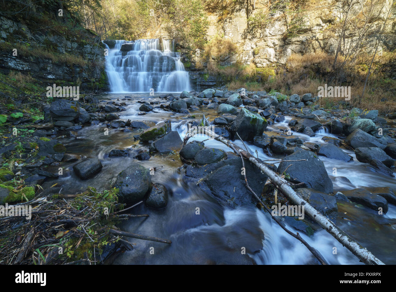 Waterfalls on the river in autumn, Sakhalin Island, Russia Stock Photo ...