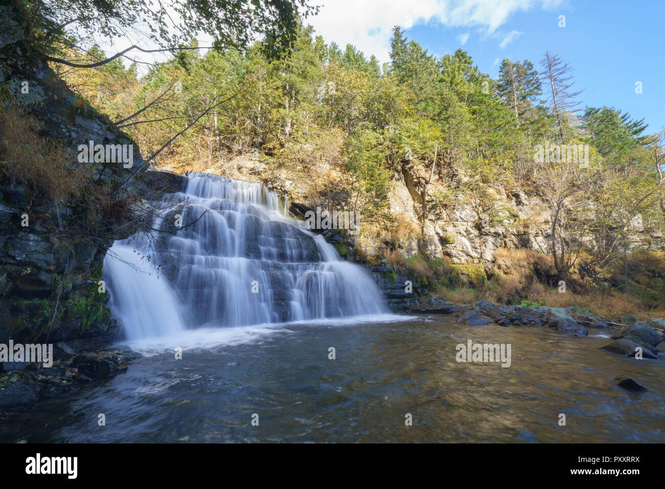 Waterfalls on the river in autumn, Sakhalin Island, Russia Stock Photo ...