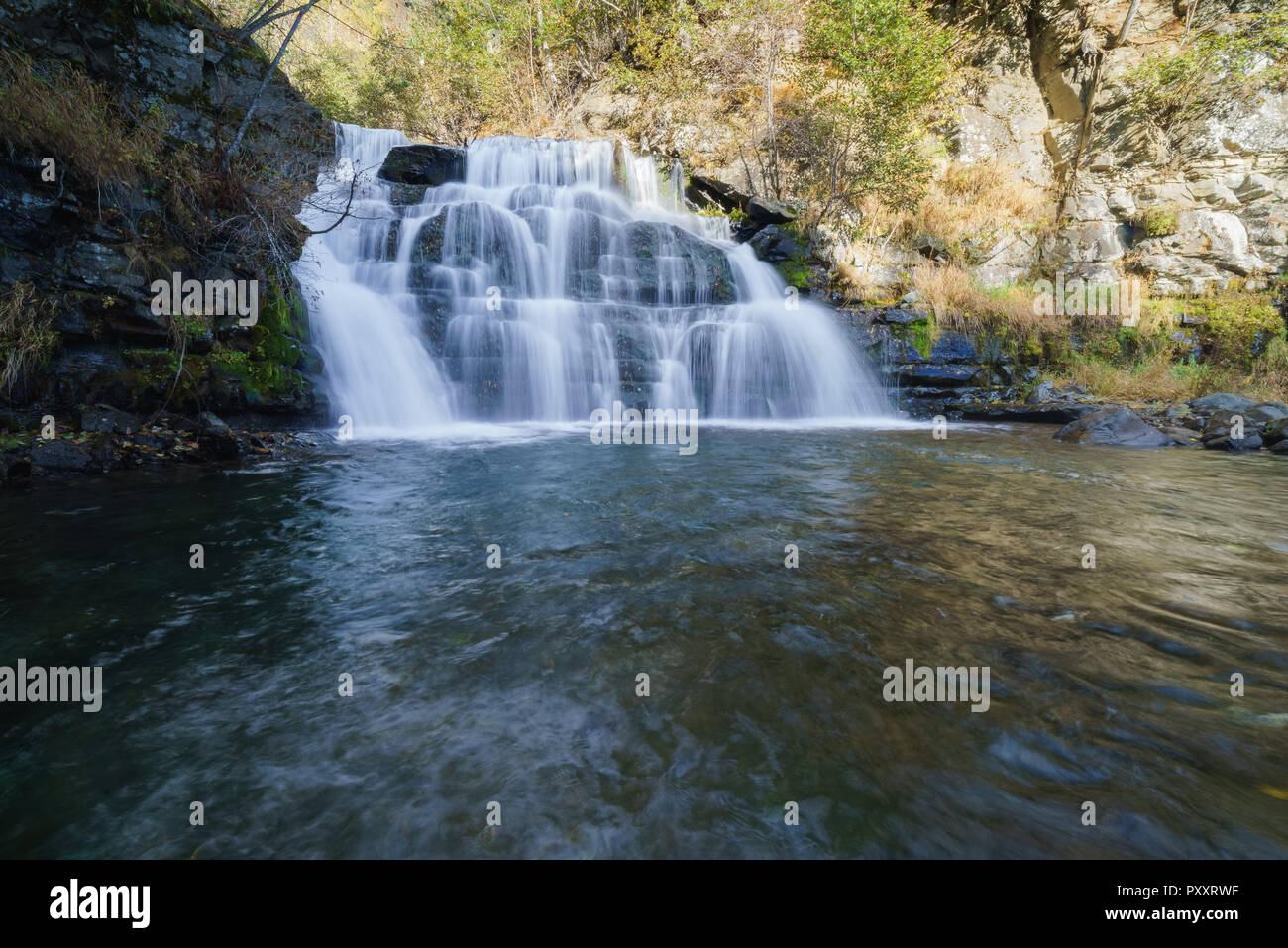 Waterfalls on the river in autumn, Sakhalin Island, Russia Stock Photo ...