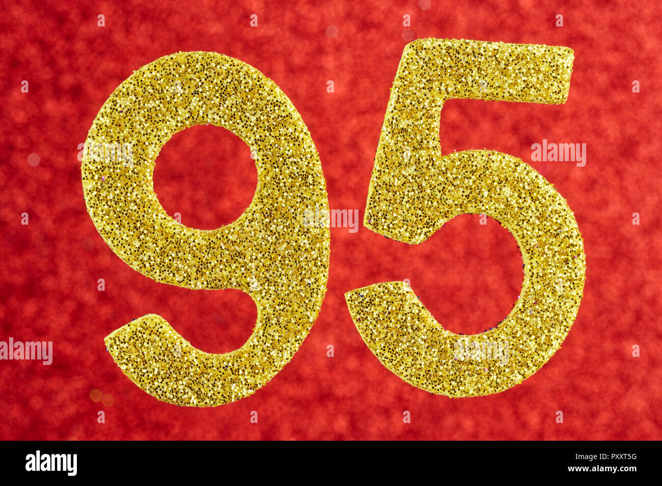 Number ninety-five golden color over a red background. Anniversary ...