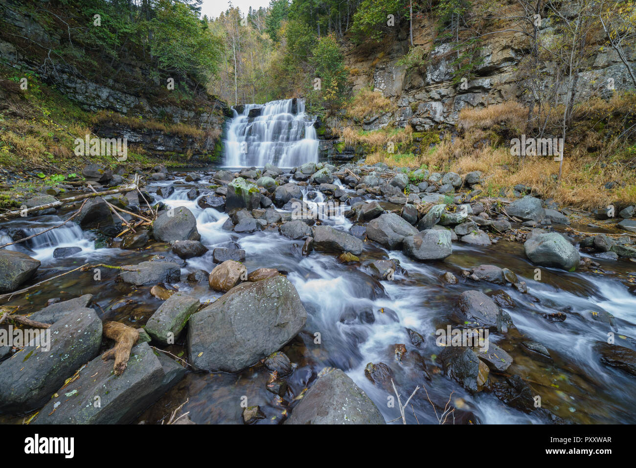 Waterfalls on the river in autumn, Sakhalin Island, Russia Stock Photo ...