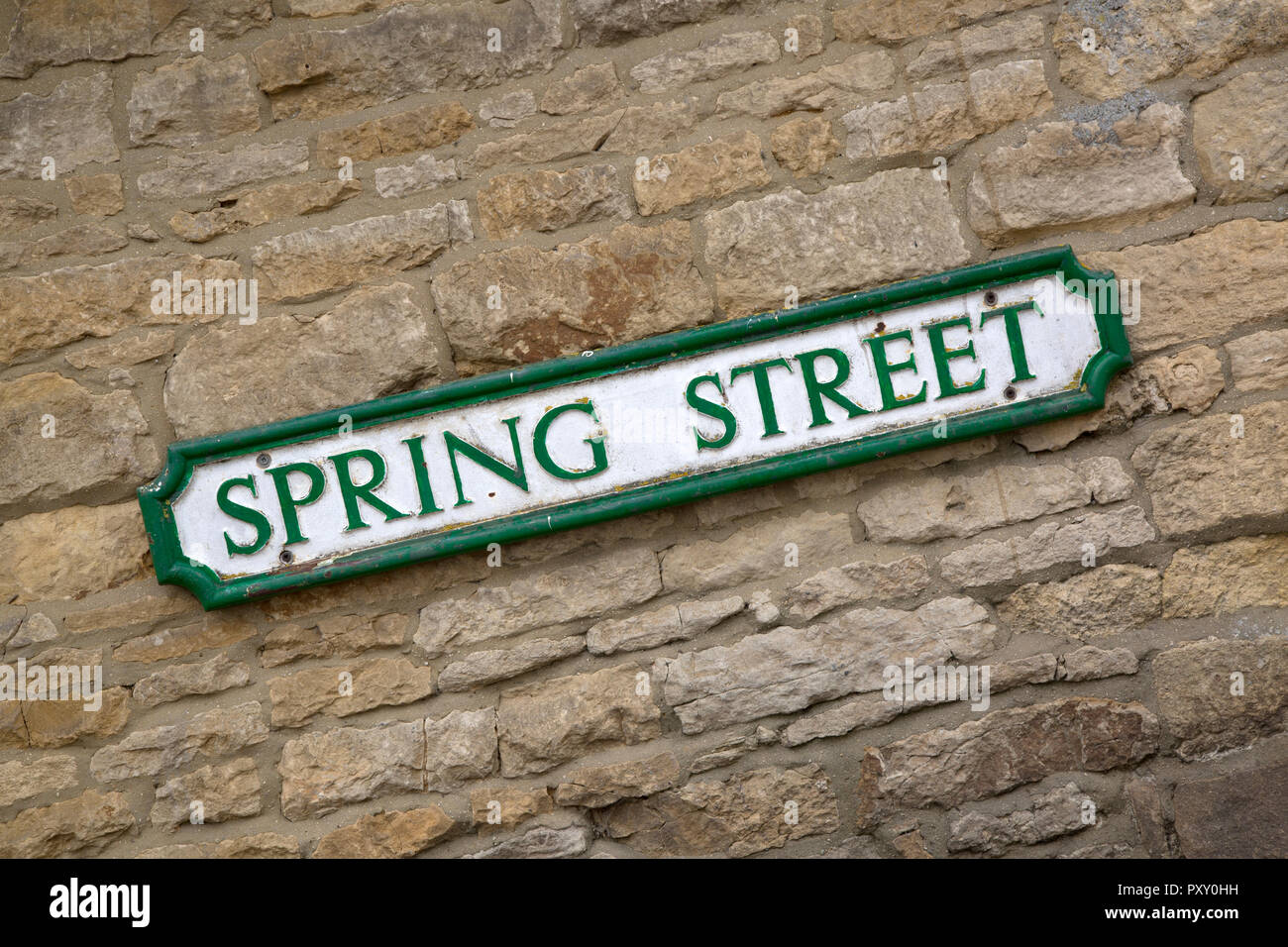 Spring Street Road Sign on Diagonal Tilt Stock Photo - Alamy