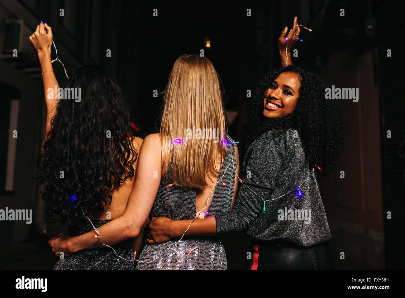 Three friends walking hi-res stock photography and images - Alamy