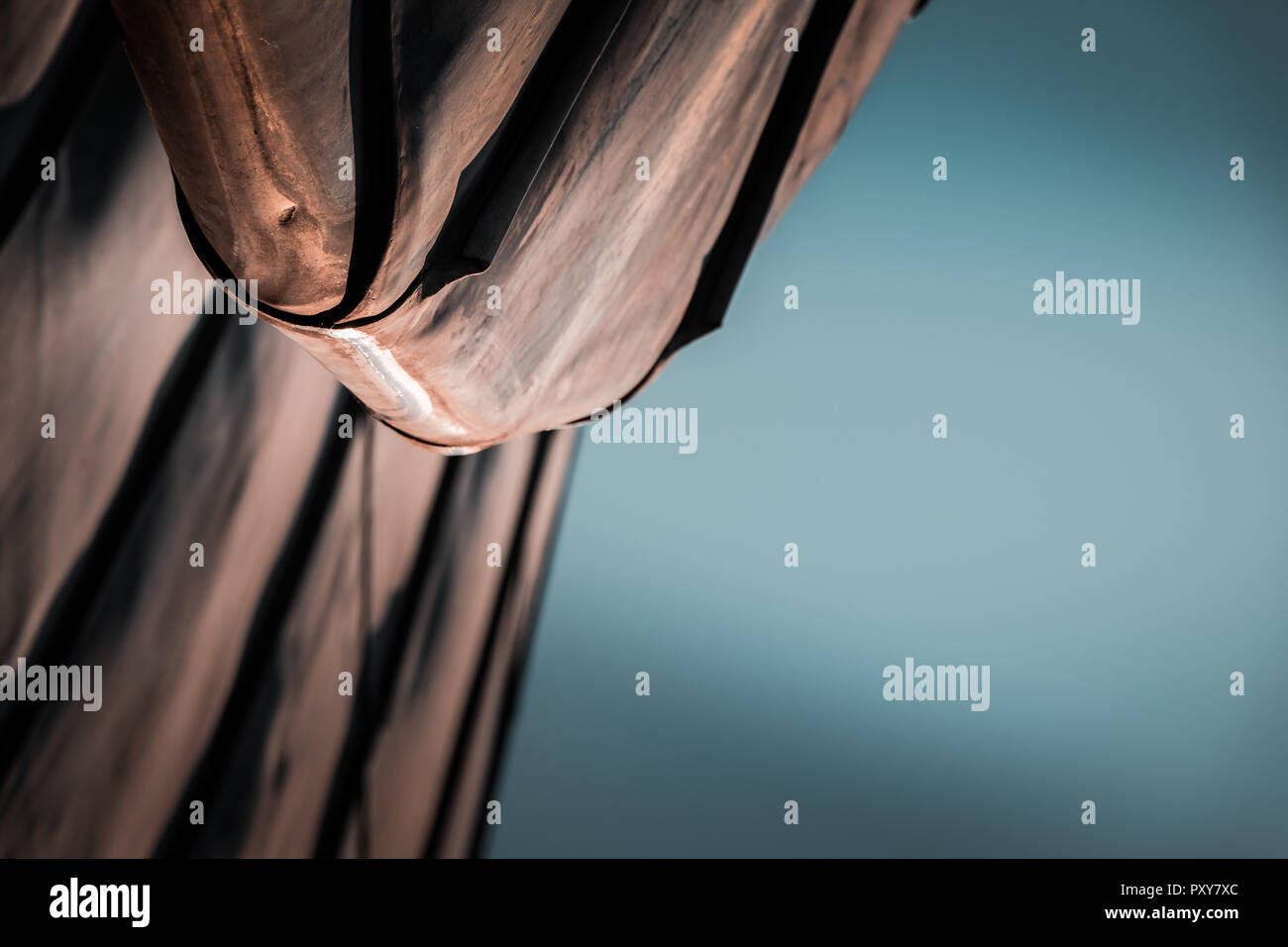 Details of rusty steel structural sheets, used for external roofing ...