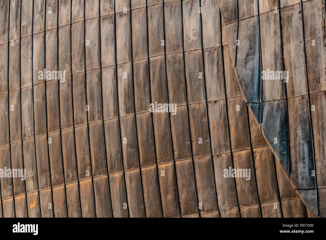 Details of rusty steel structural sheets, used for external roofing ...
