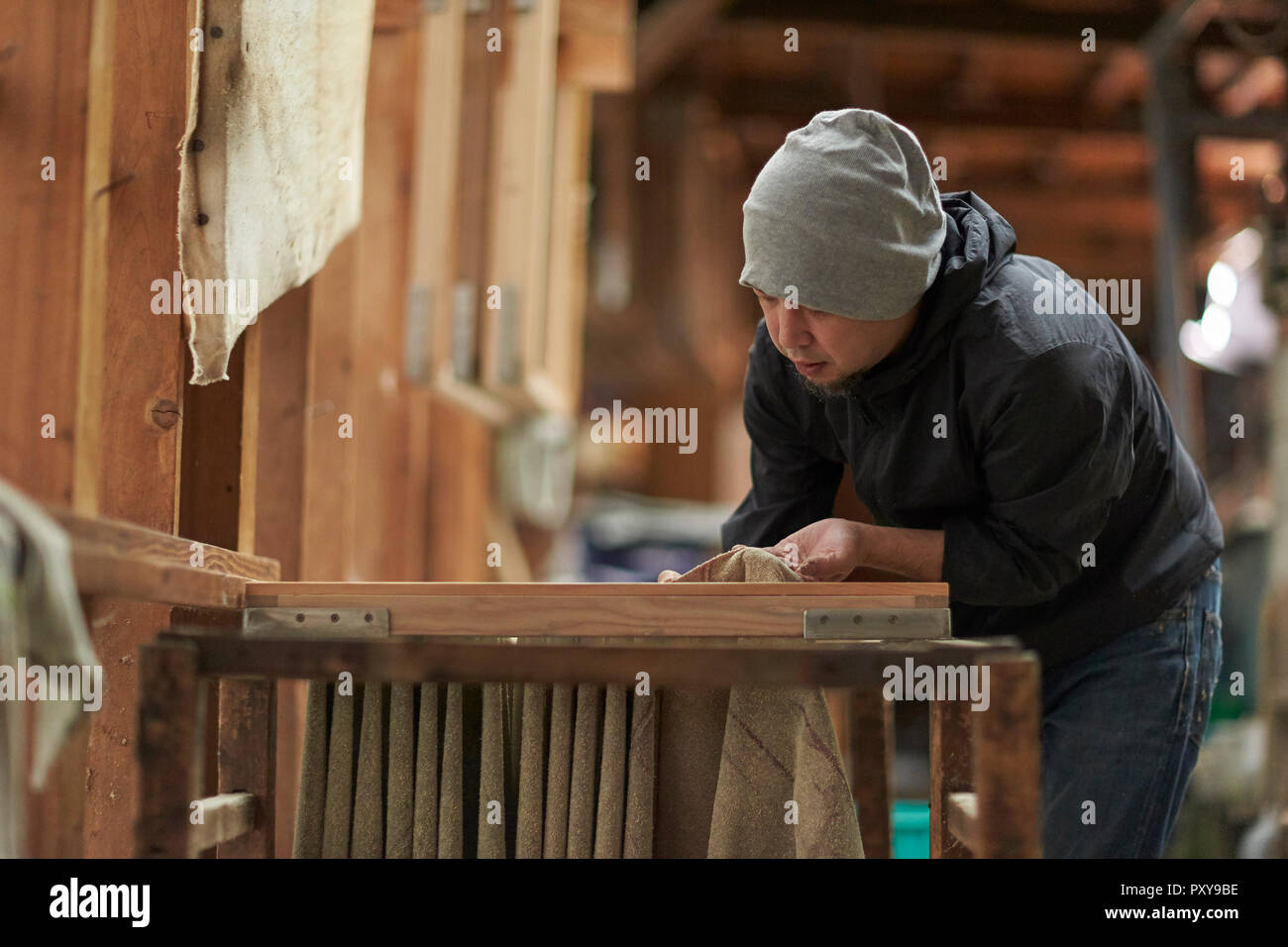 Japanese artisan working in the studio Stock Photo - Alamy