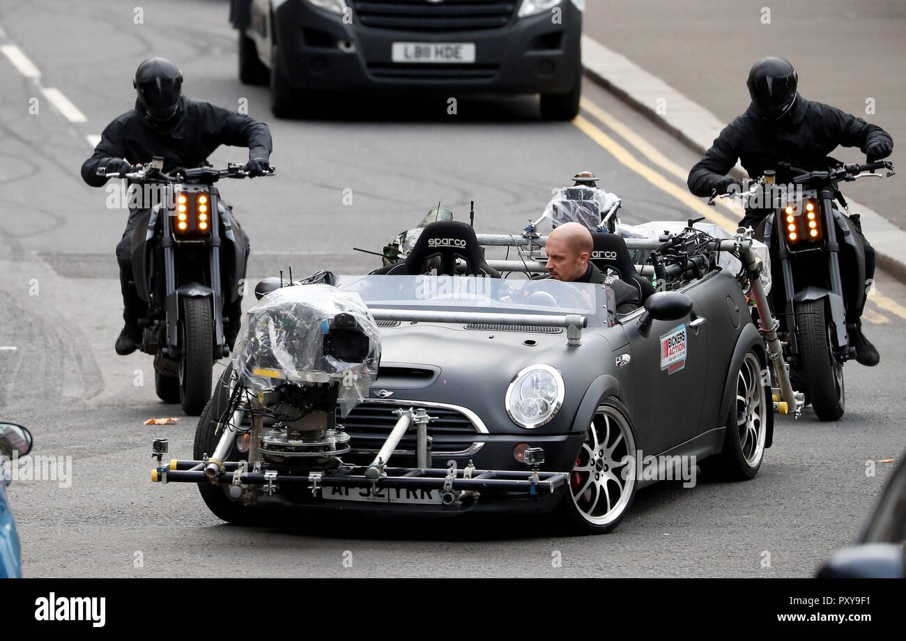 Filming for a car chase scene involving a McLaren sports car and ...