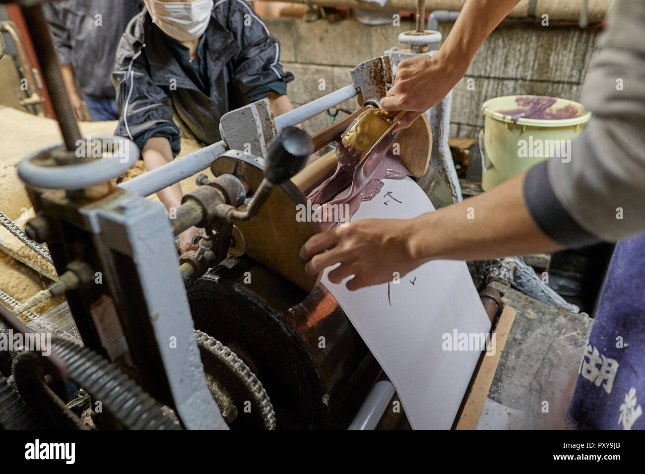 Japanese artisans working in the studio Stock Photo - Alamy