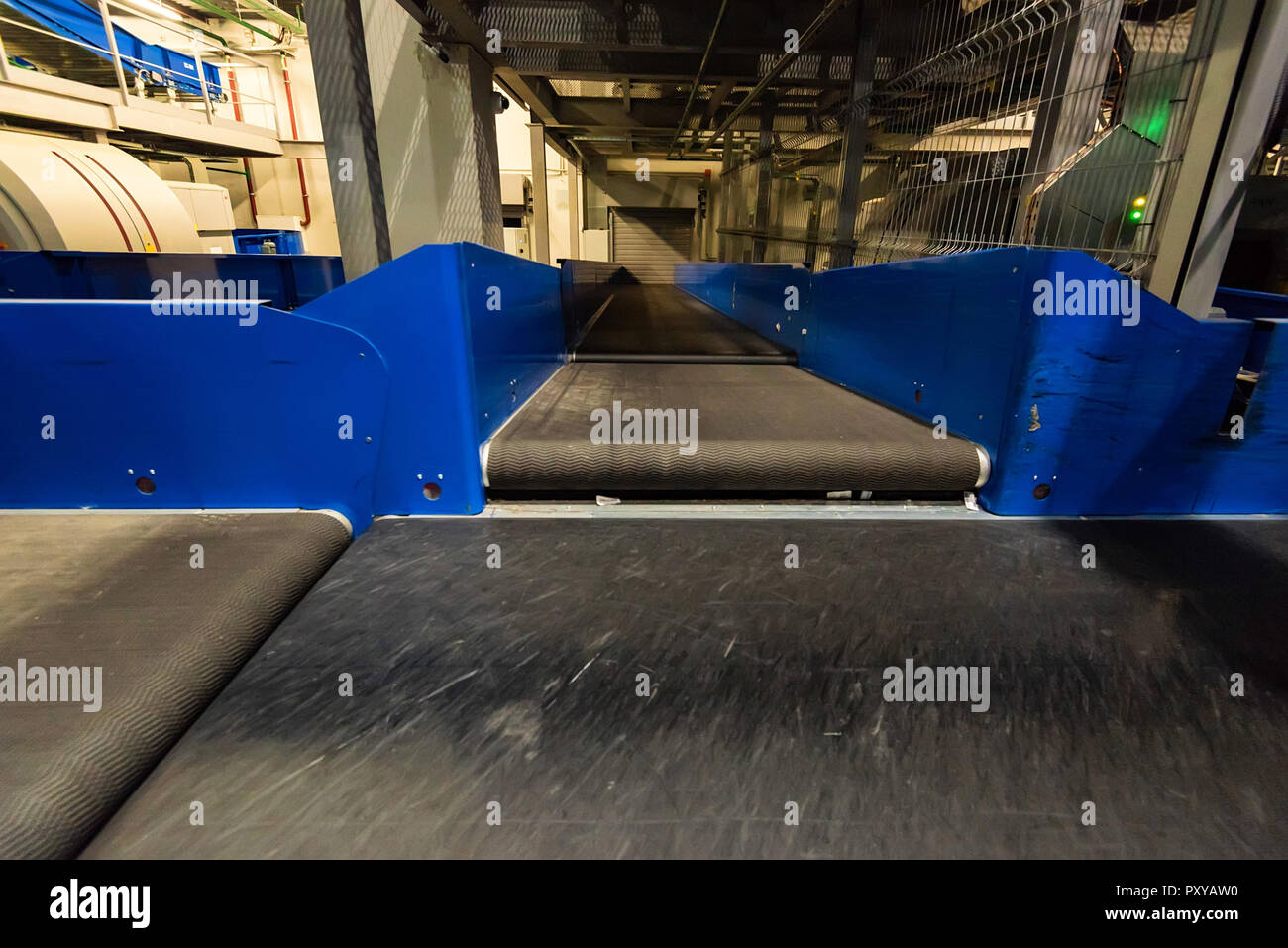 Baggage claim area with empty baggage carousels Stock Photo - Alamy
