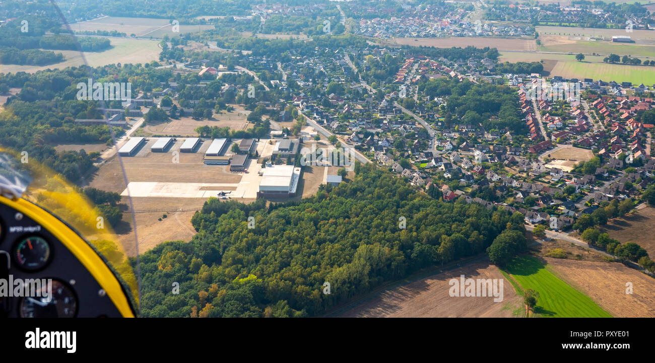 View from the ultralight airplane to a German suburb with offshore ...