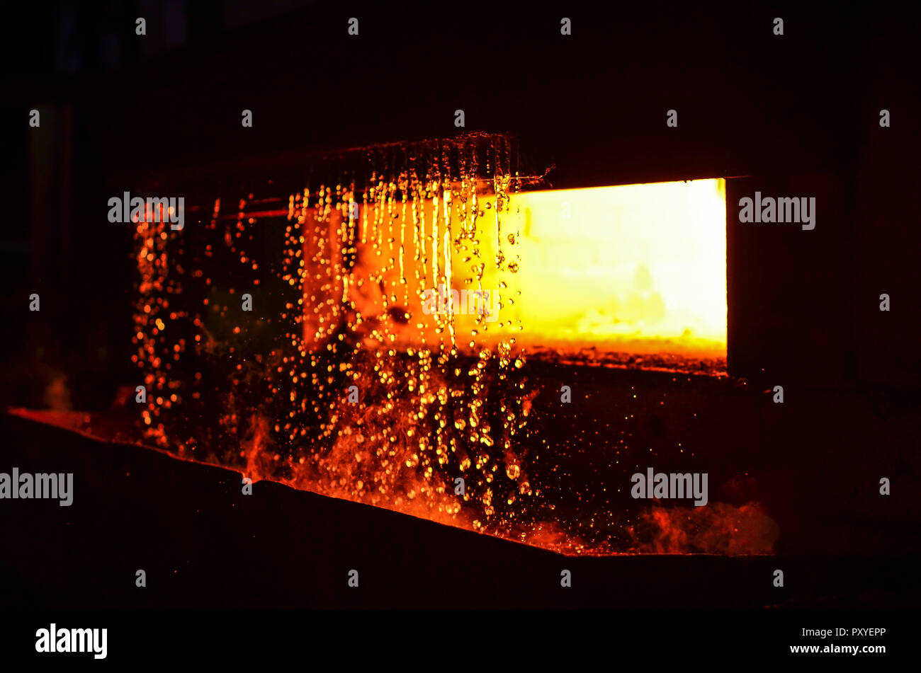 Blast furnace smelting liquid steel in steel mills. Melting of metal in ...
