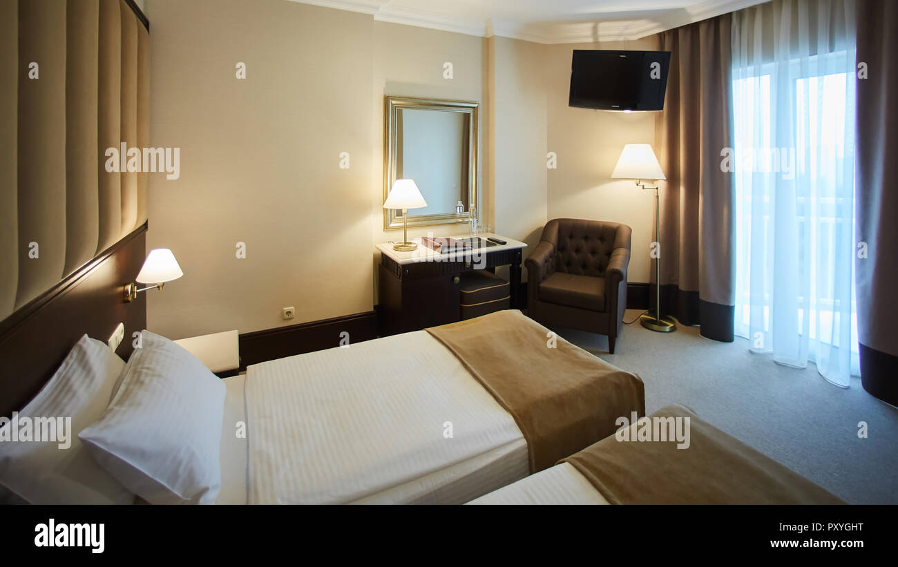 Two beds in a hotel room. Interior design Stock Photo - Alamy
