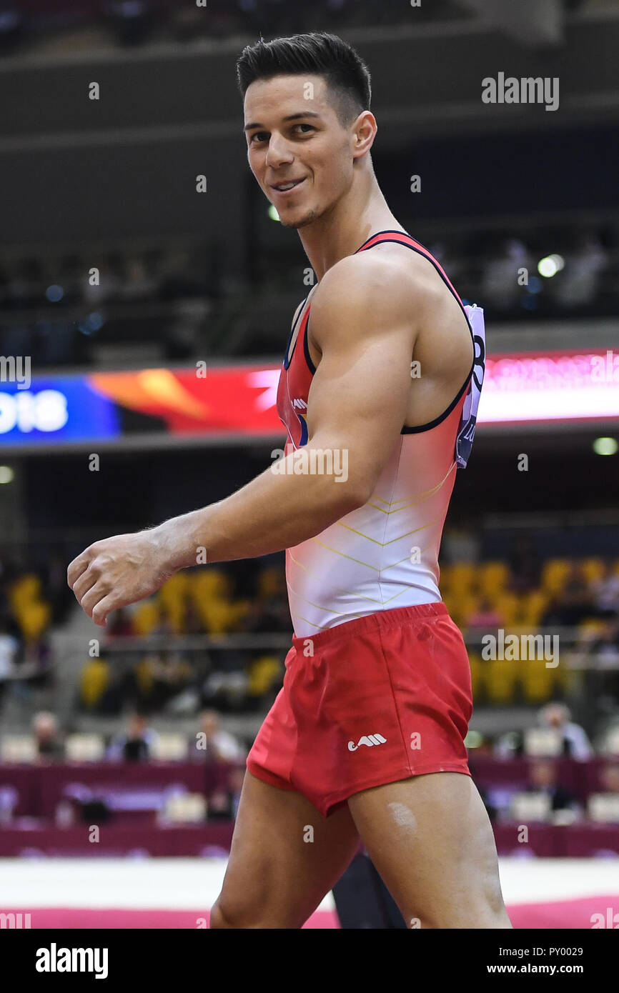Doha, Qatar. 25th Oct, 2018. ANDREI VASILE MUNTEAN from Romania smiles at fans after competing ...