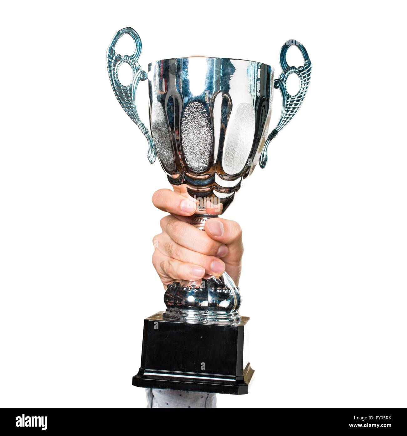 Hand of man holding holding a trophy Stock Photo - Alamy