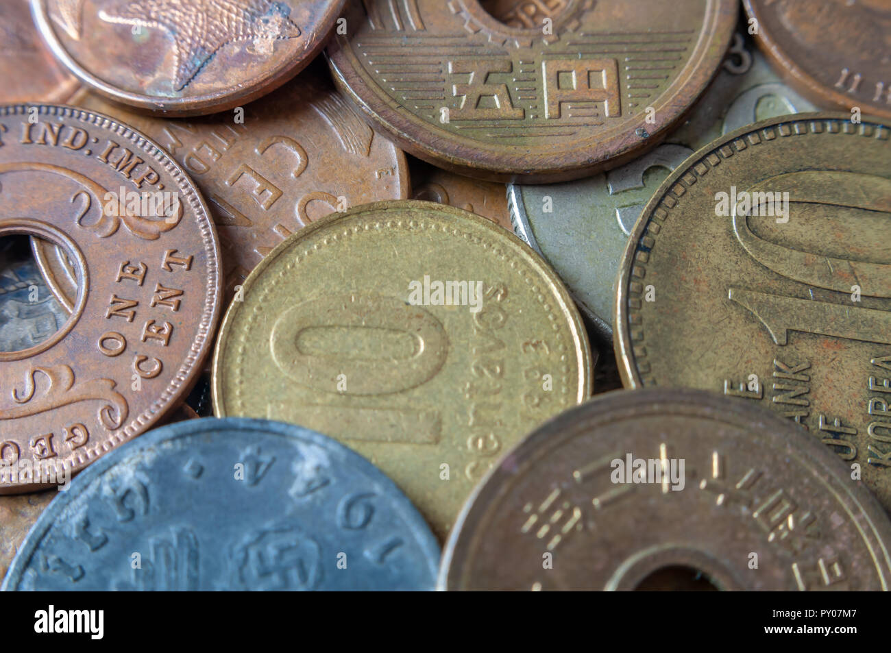 Coins from around world hi-res stock photography and images - Alamy