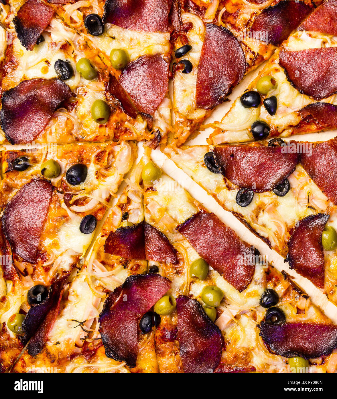 Pepperoni pizza background Stock Photo - Alamy