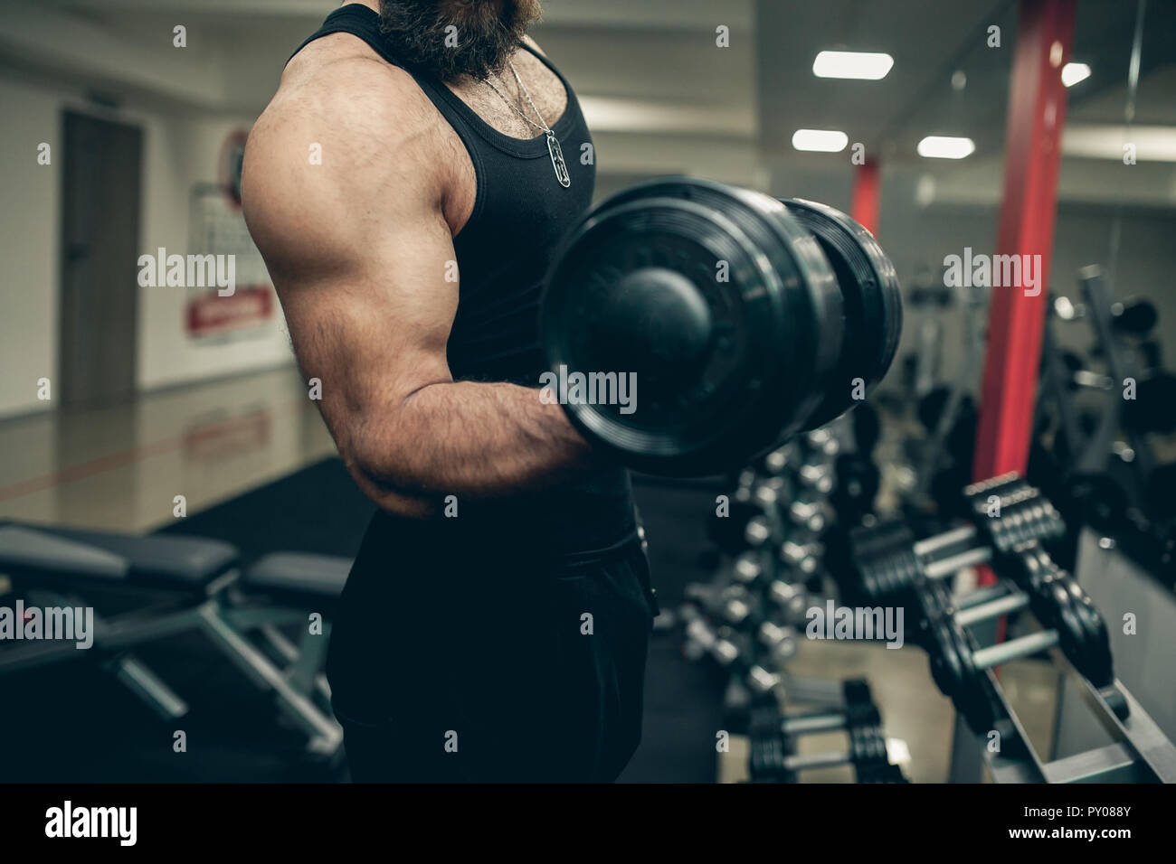 lifting person gym standing sport Stock Photo - Alamy