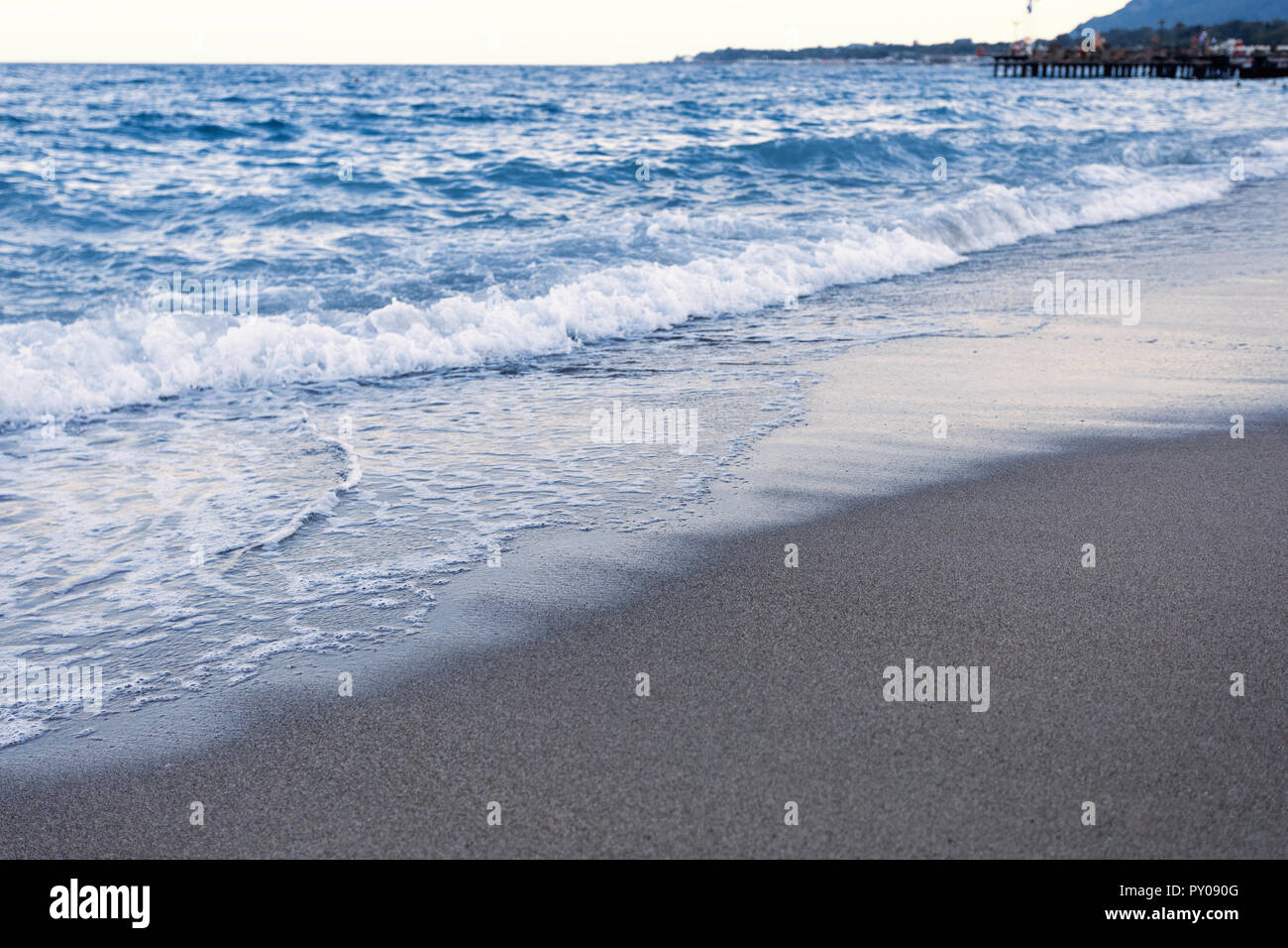 Blue waves in the sand Stock Photo - Alamy