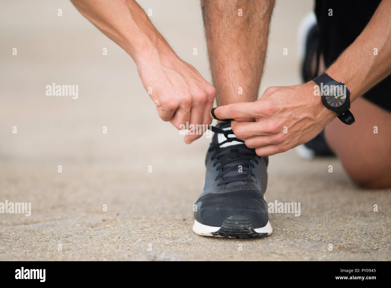 Close up unrecognizable man lacing hi-res stock photography and images ...