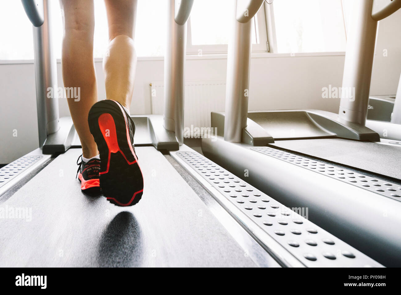 Female muscular legs on treadmill hi-res stock photography and images ...
