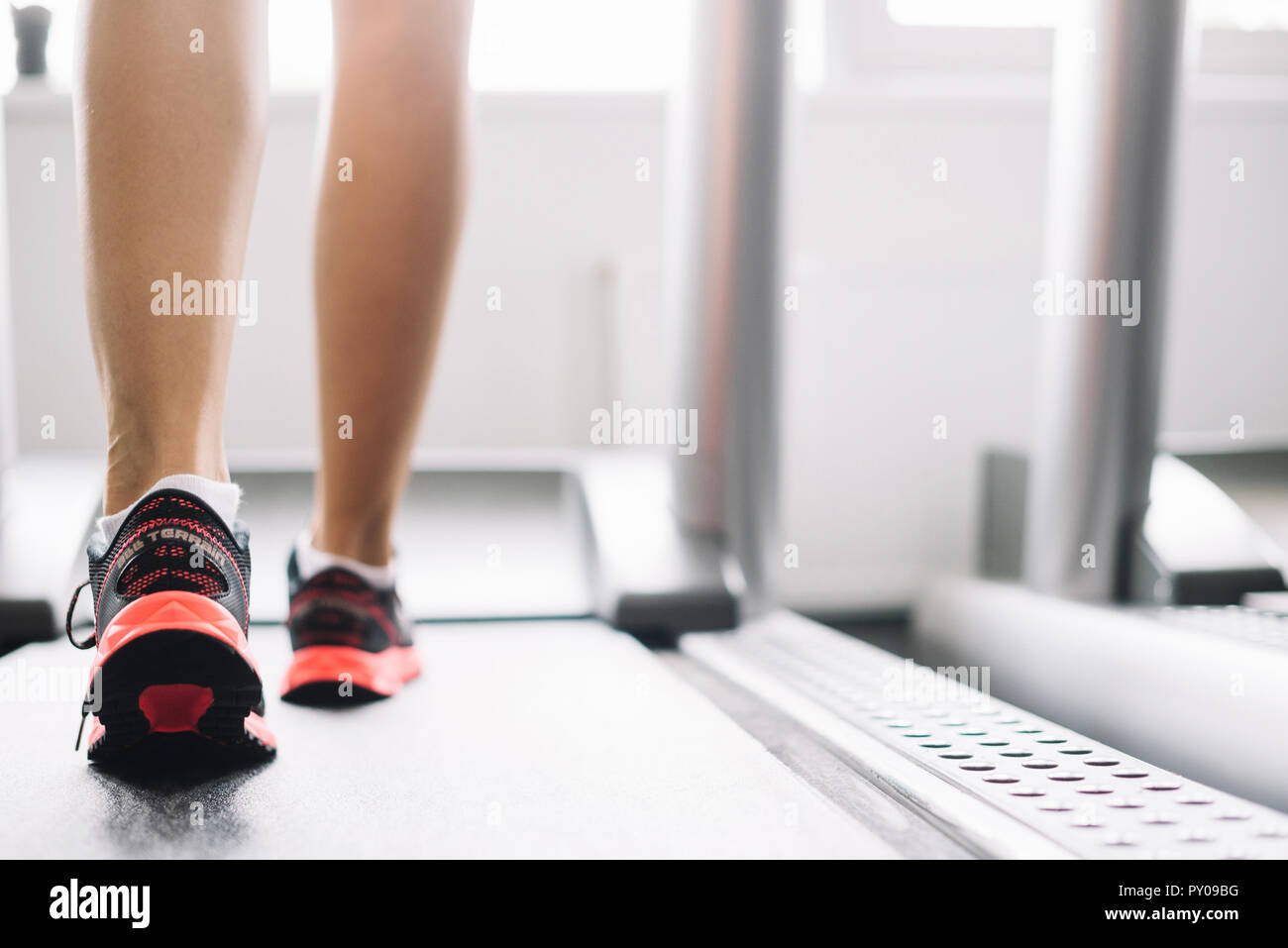 Woman using treadmill hi-res stock photography and images - Alamy