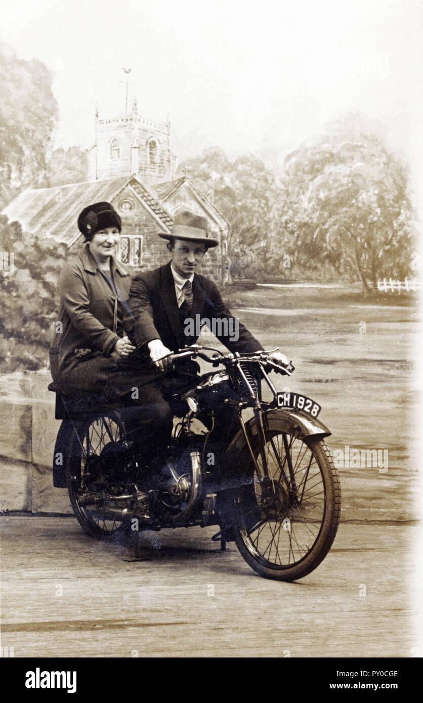 Gentleman & lady pose for a studio photograph on a 1929 Grindley ...