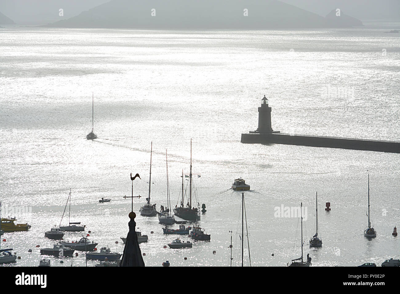 Guernsey Island, Chanel Island. View at harbour, silver ocean, lantern ...