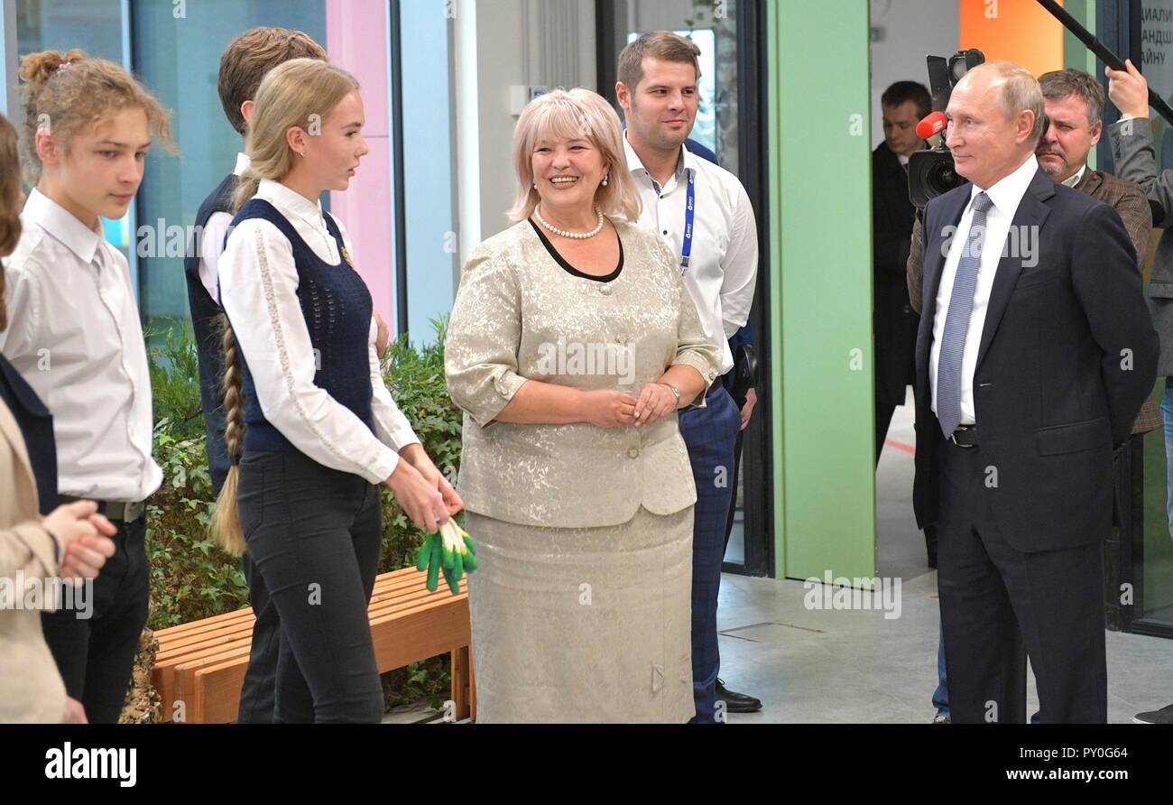 Russian President Vladimir Putin, right, meets with students and ...