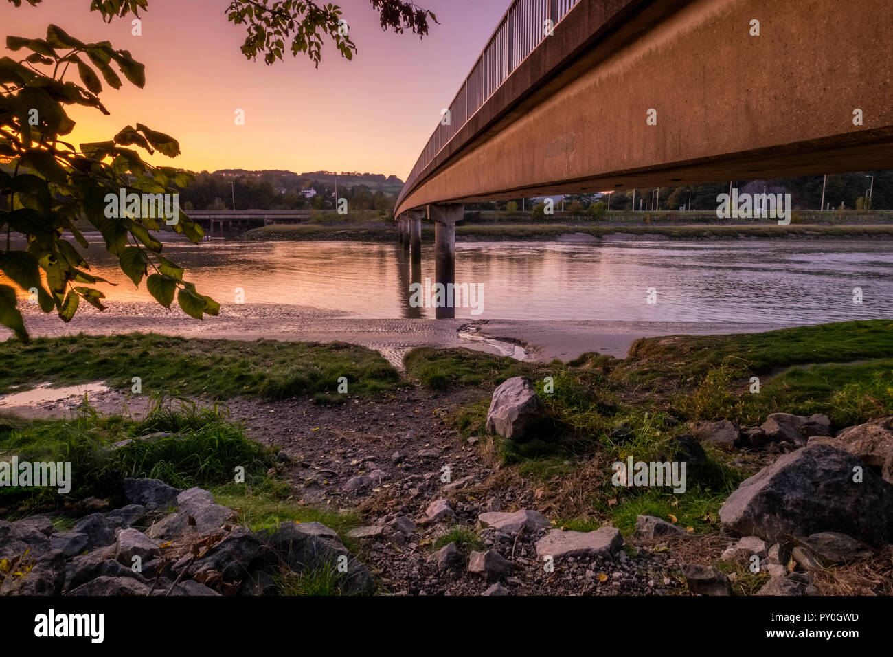 Sunset on an oddly hot October day catches the bridge over the Leven ...