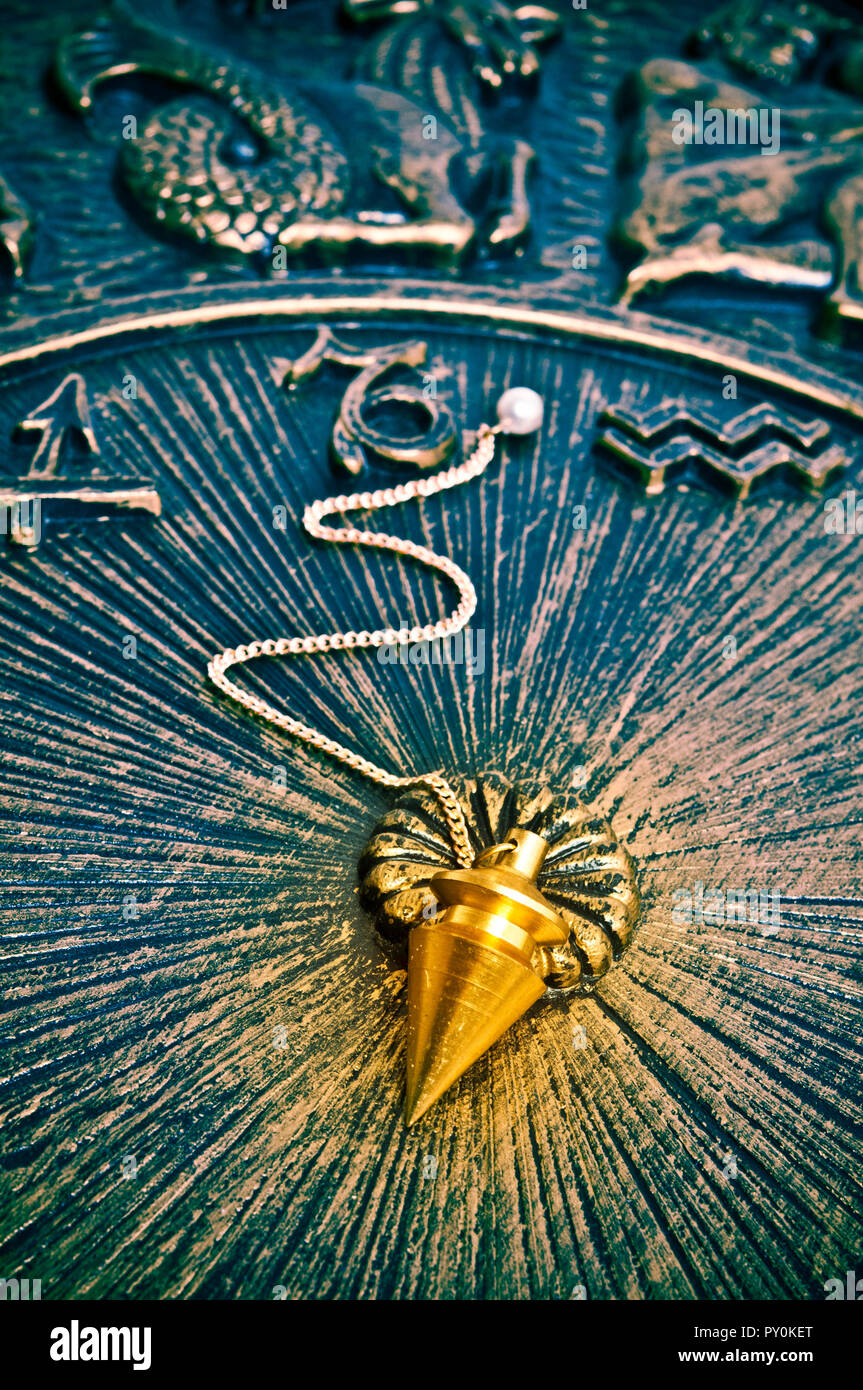 astrology and magic pendulum Stock Photo - Alamy