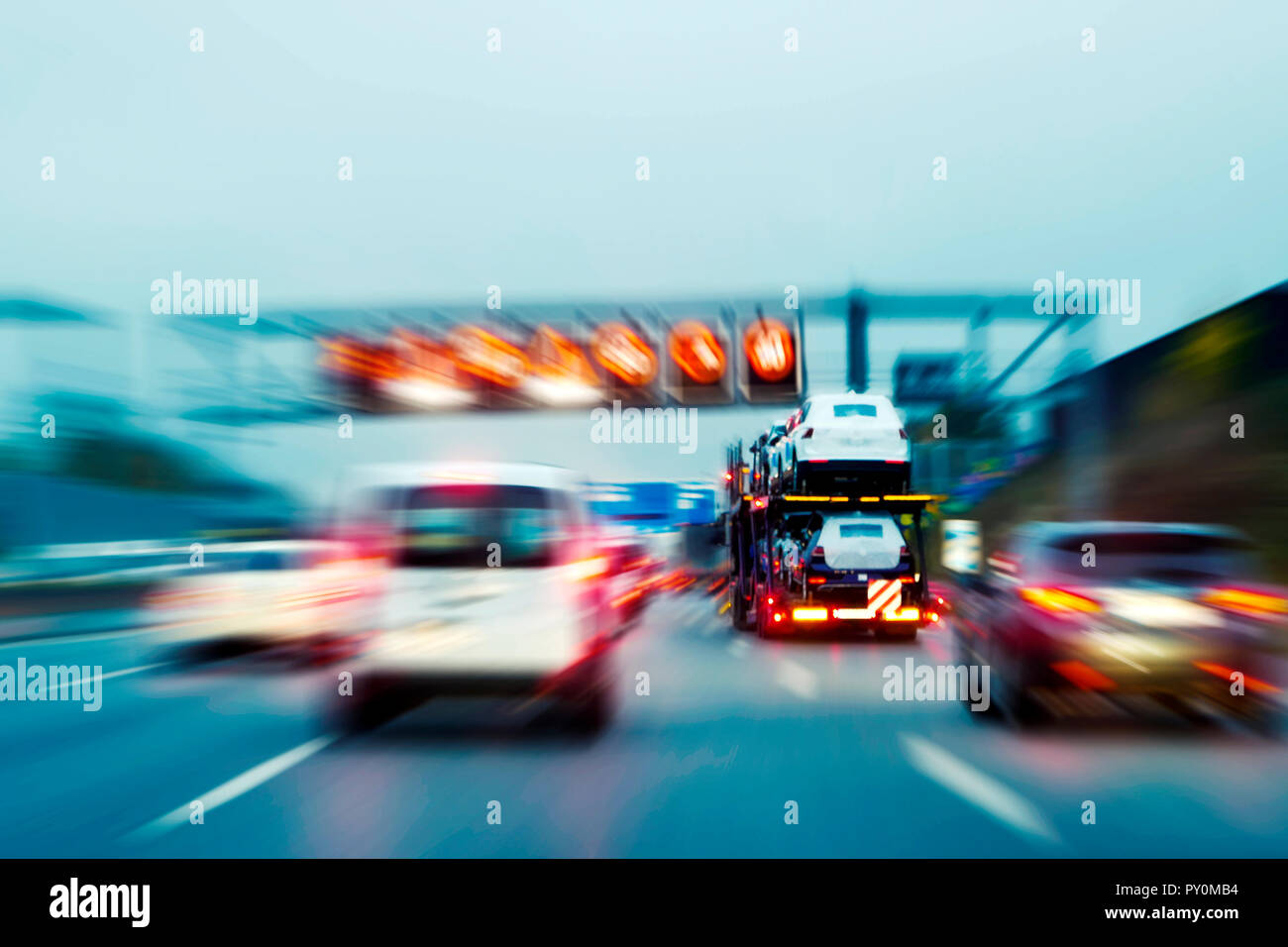 Lorry with new cars driving on motorway, Logistics background Stock ...