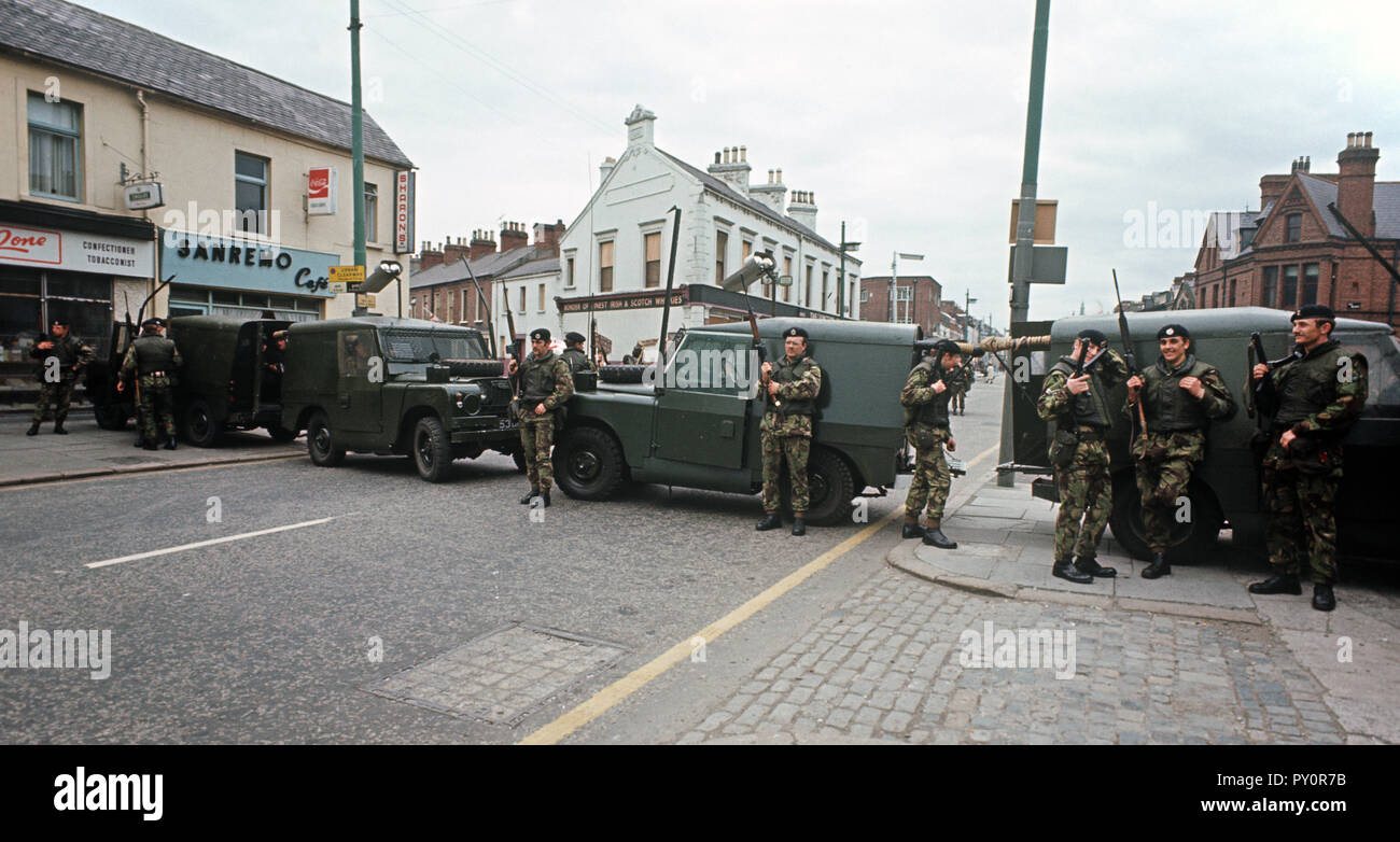 Belfast, 1972: British Army Land Rovers and soldiers blocking road in ...