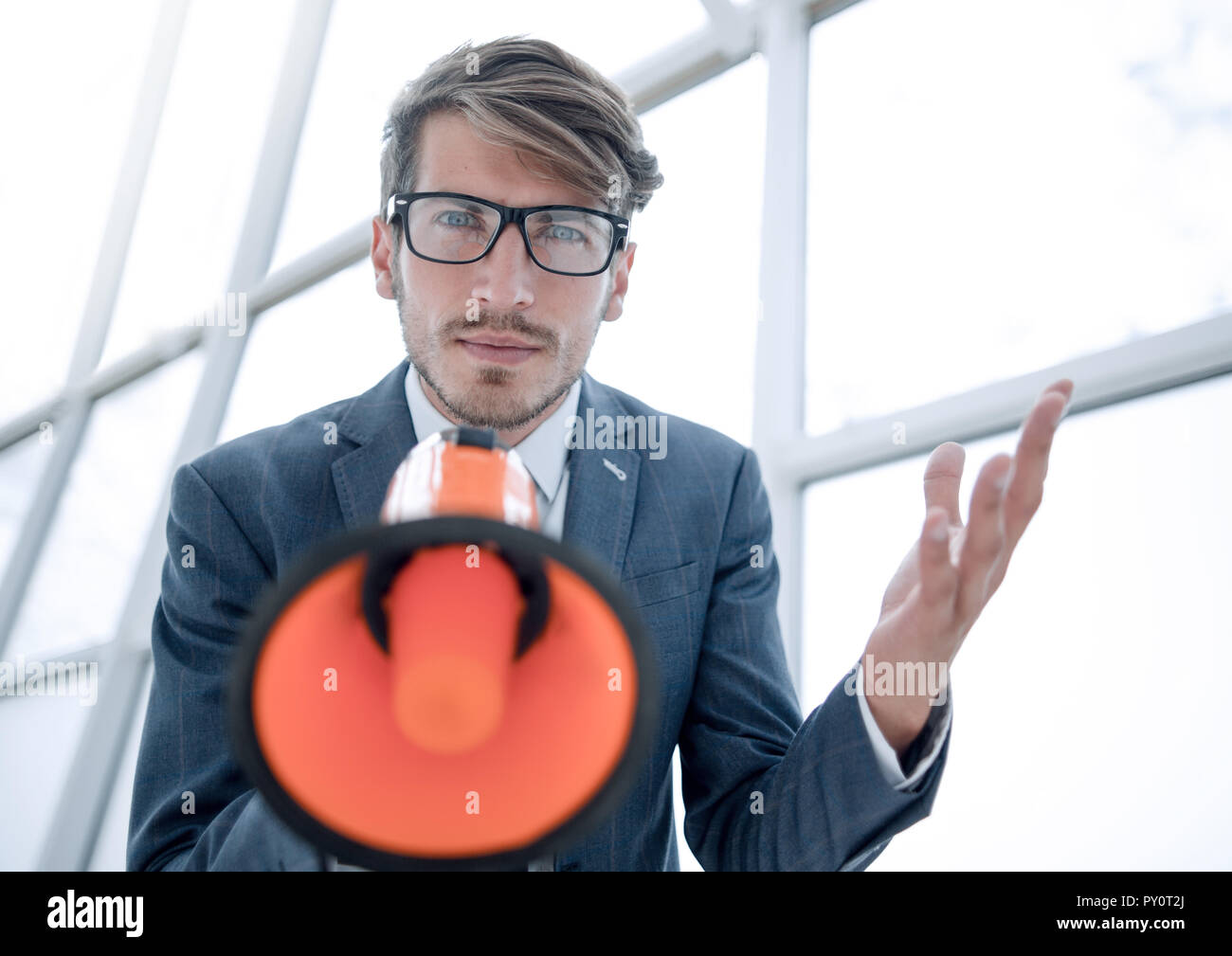 businessman screaming megaphone Stock Photo - Alamy