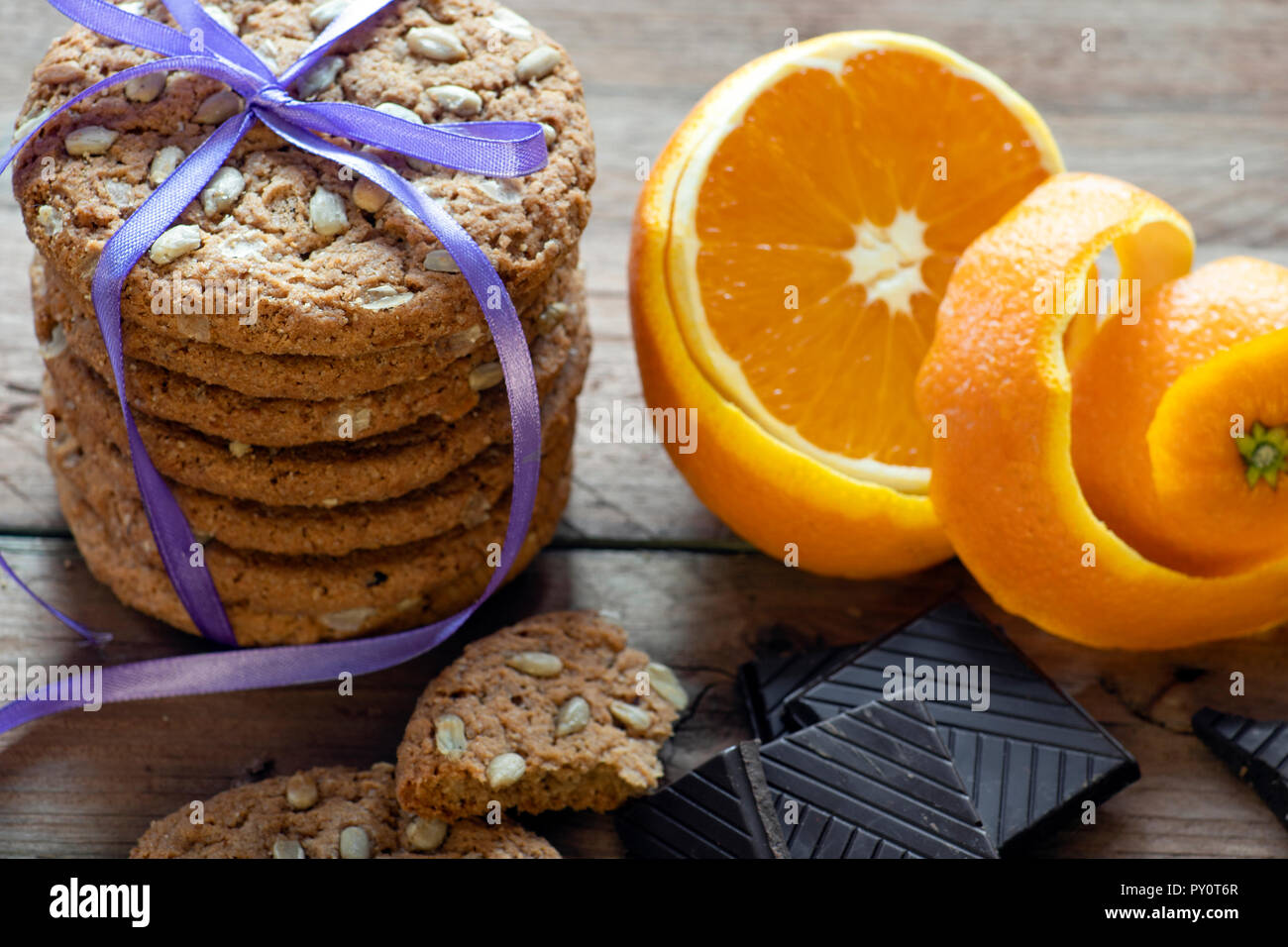 oatmeal cookies, tied with a ribbon, orange with zest and chocolate ...