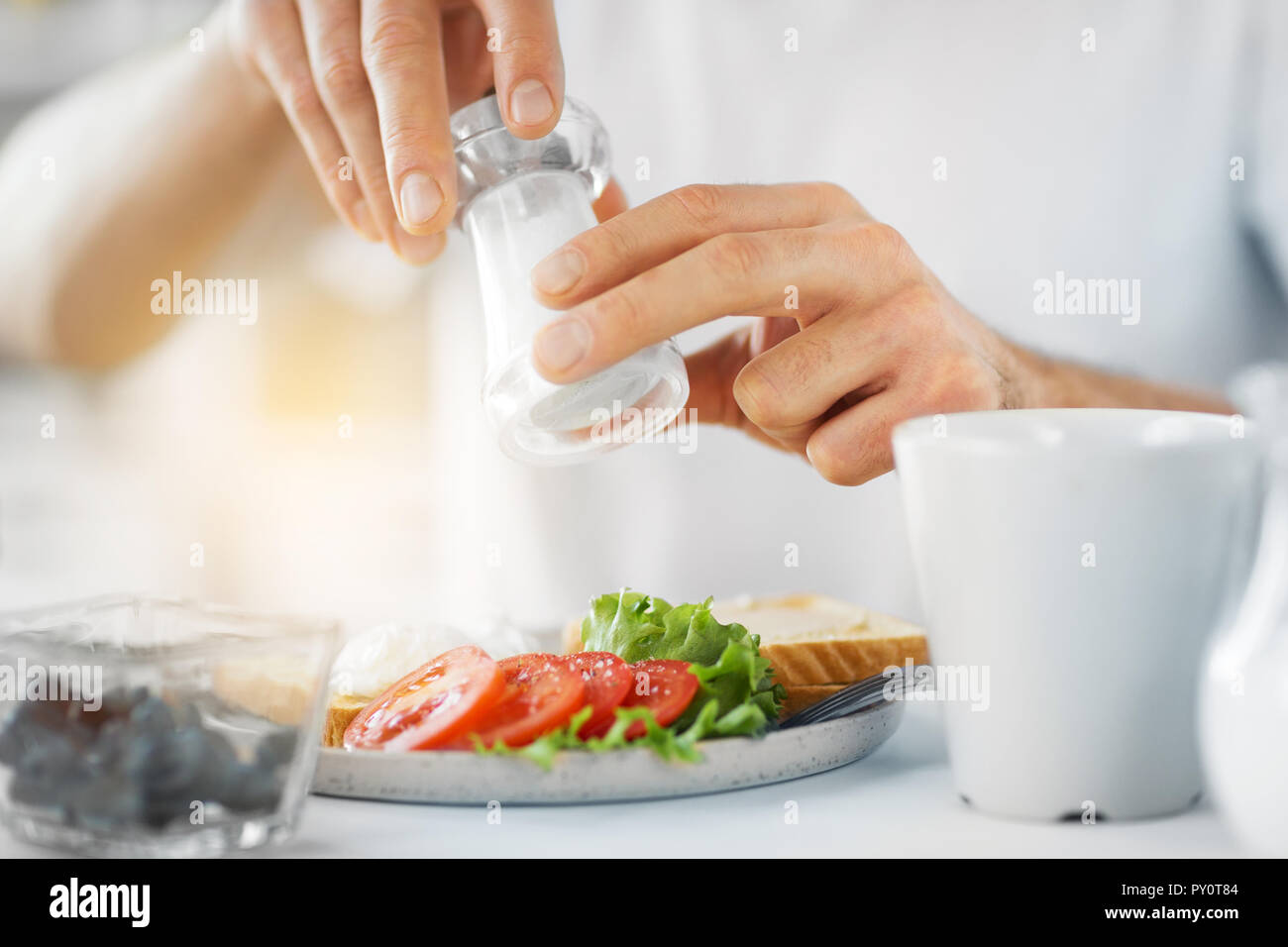 Salting food hi-res stock photography and images - Alamy