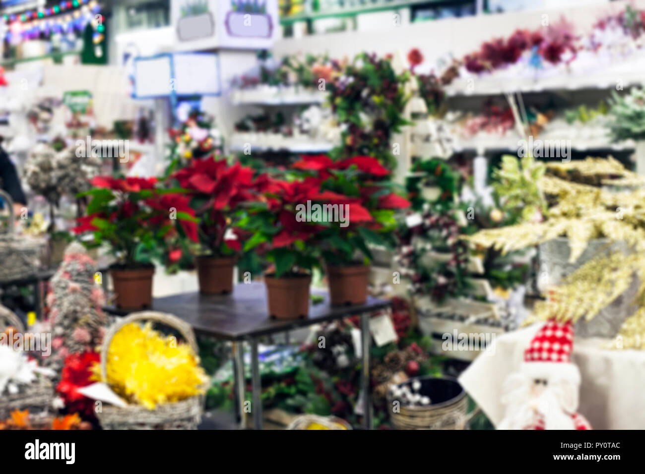 Blurred Christmas decorations in wholesale store. Blurry background ...