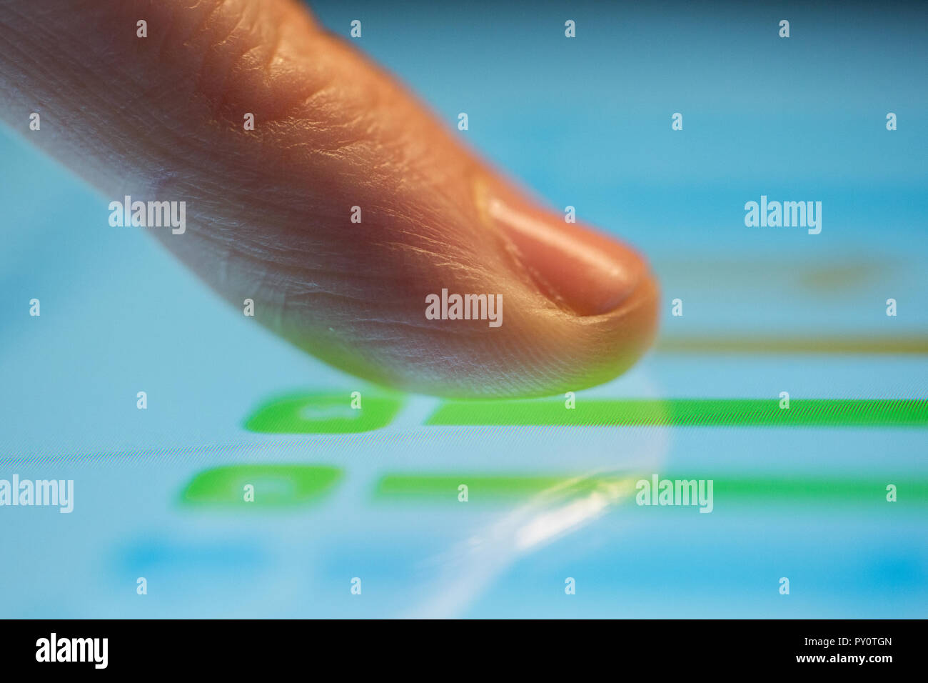close up of hand using computer touch screen Stock Photo - Alamy
