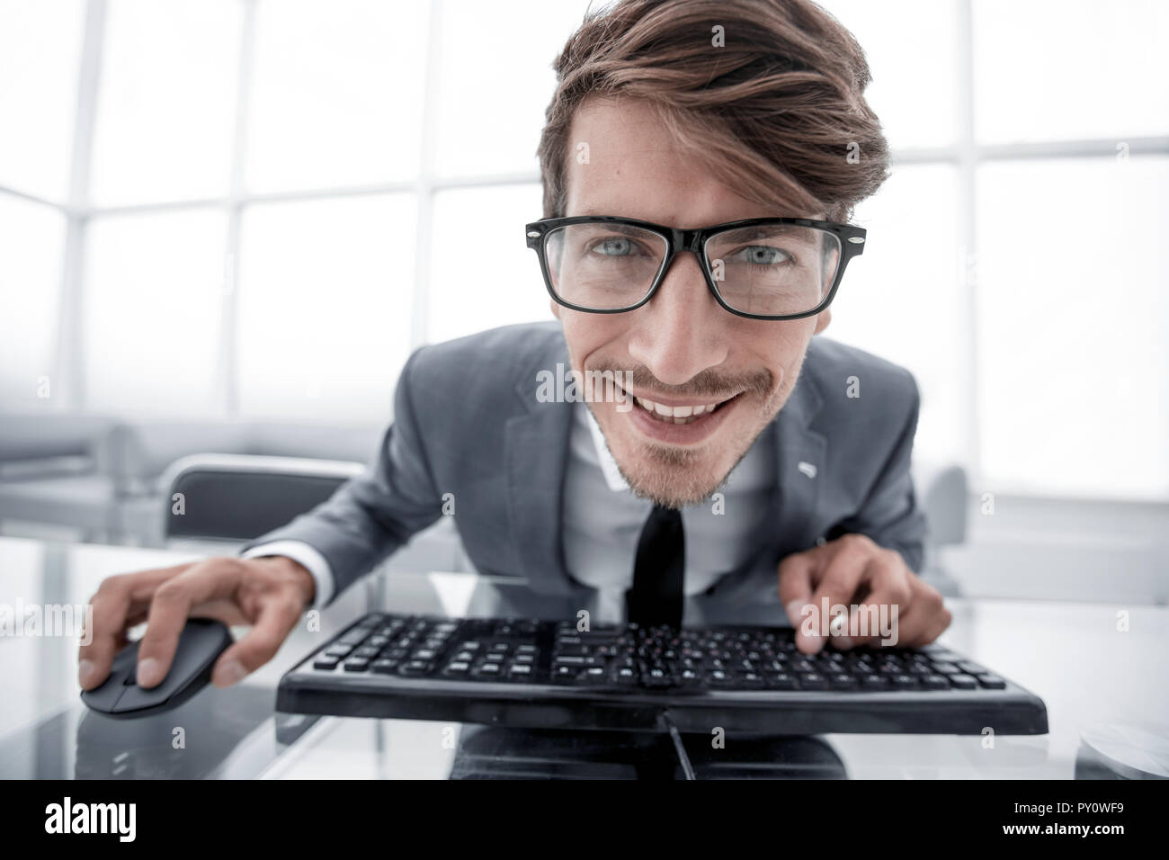 Computer geek typing on keyboard hi-res stock photography and images ...