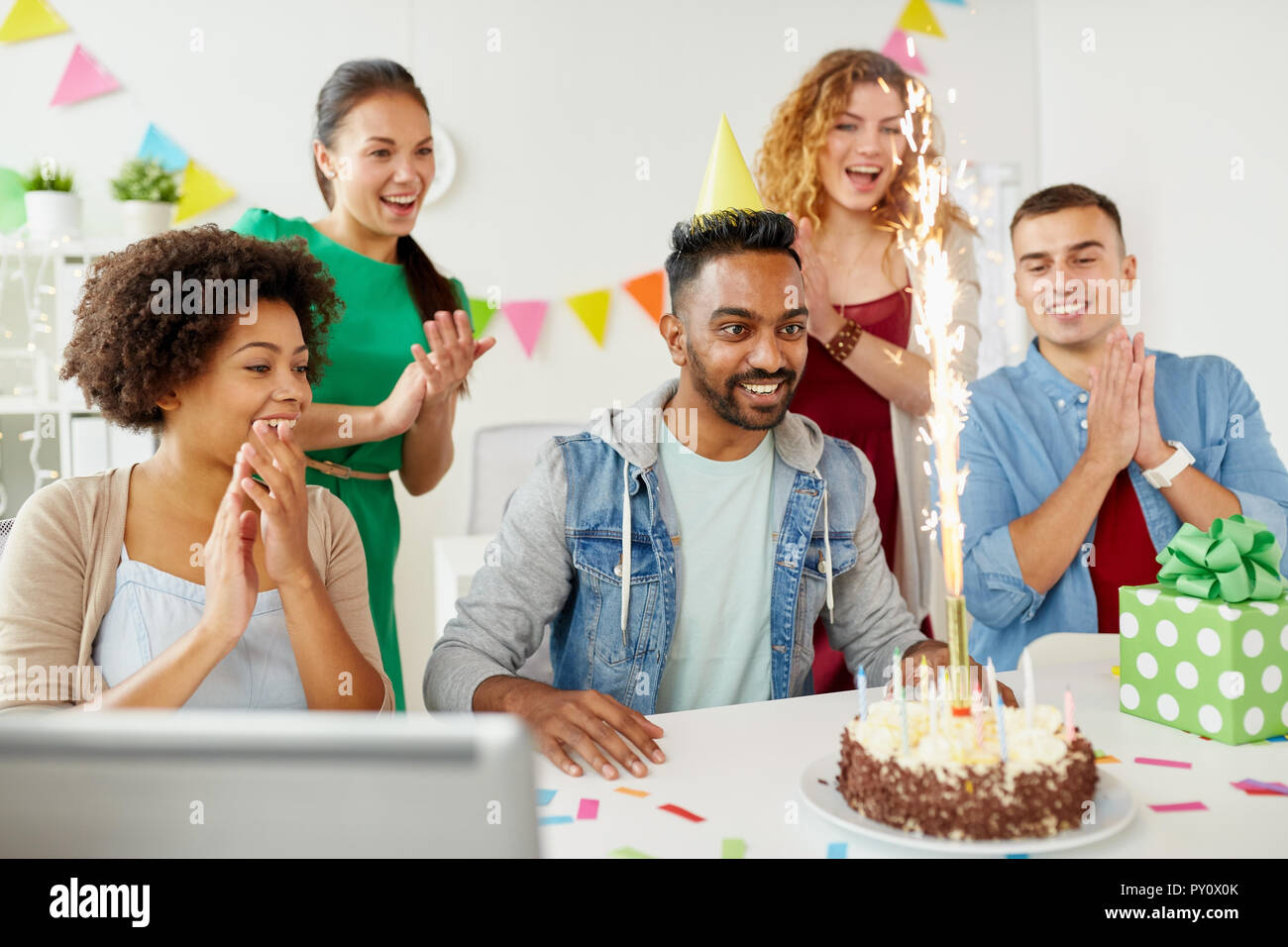 office team greeting colleague at birthday party Stock Photo - Alamy