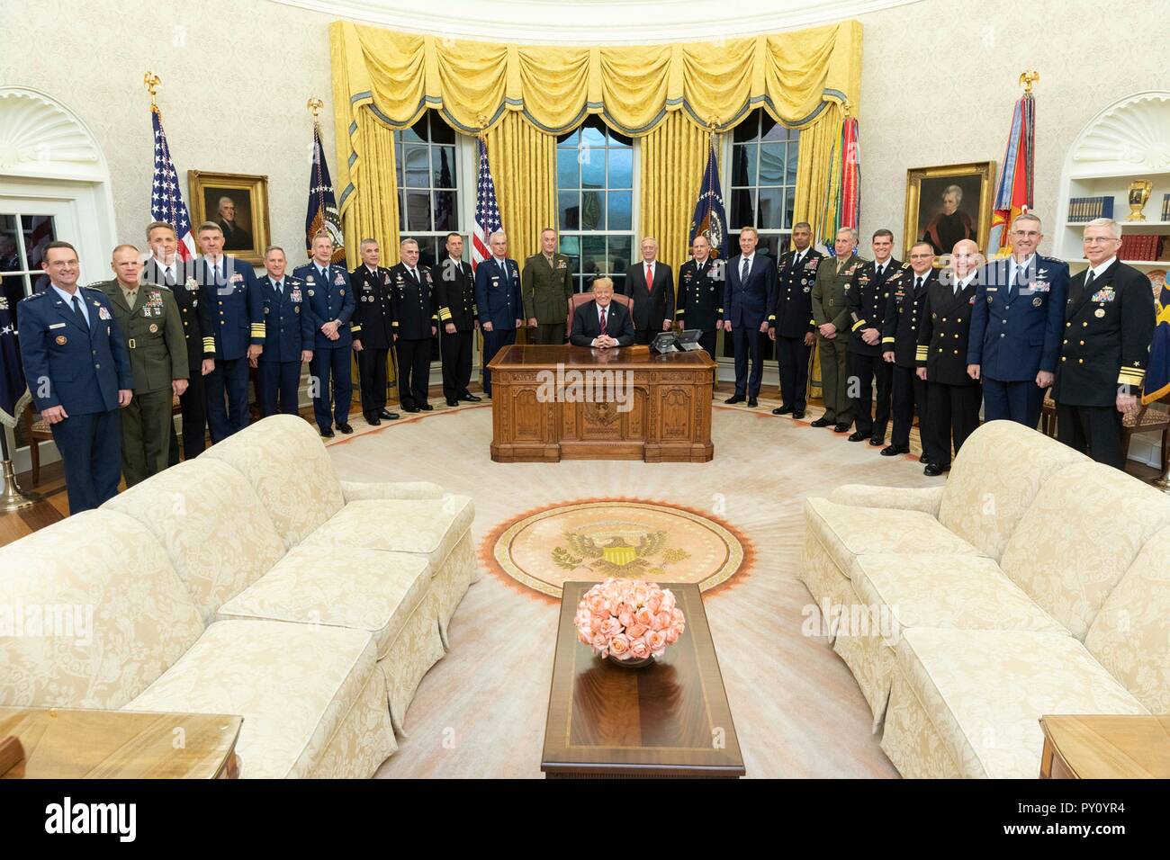 U.S President Donald Trump poses for a photo with senior military ...