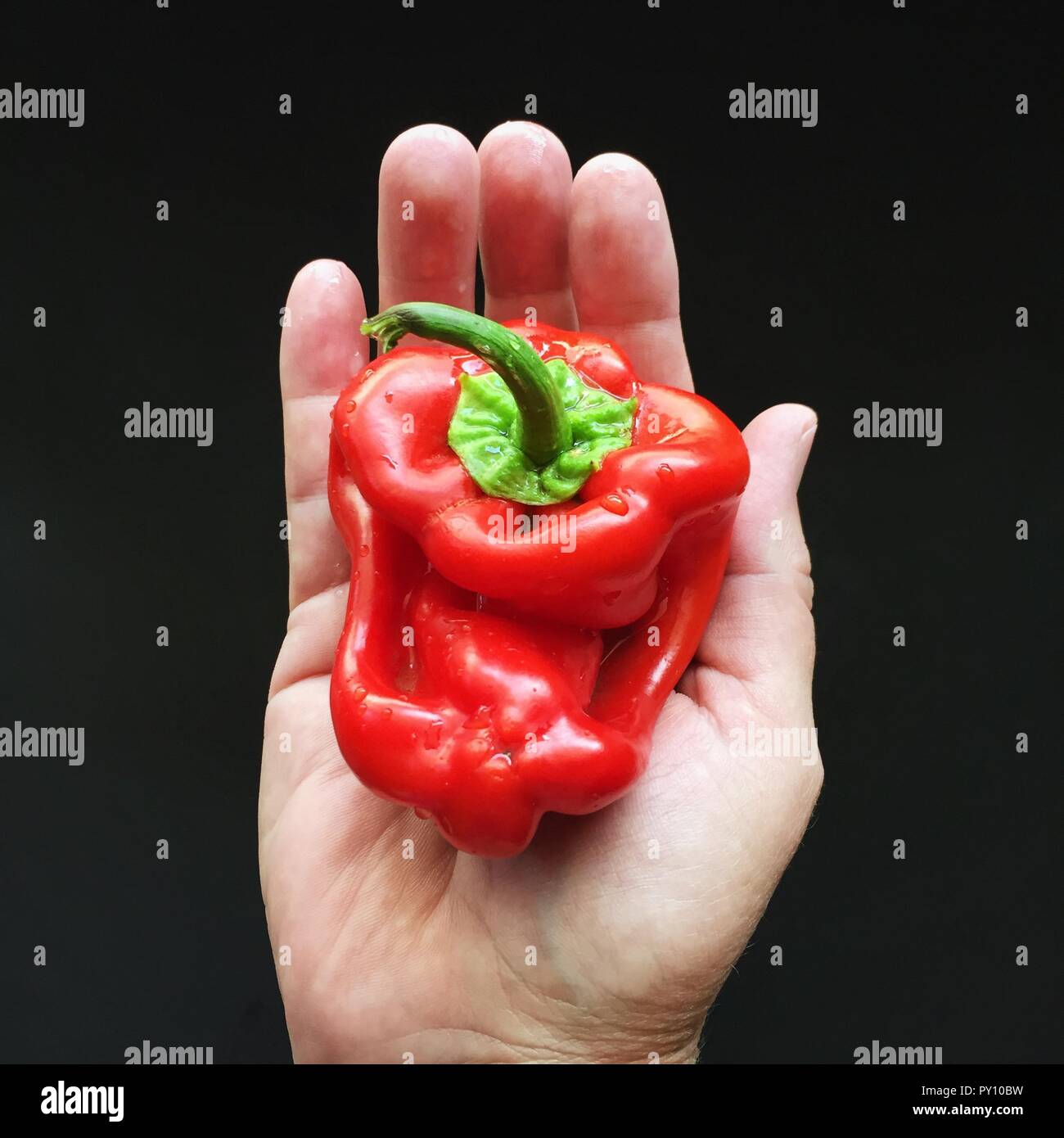Mature womans hand red hi-res stock photography and images - Alamy