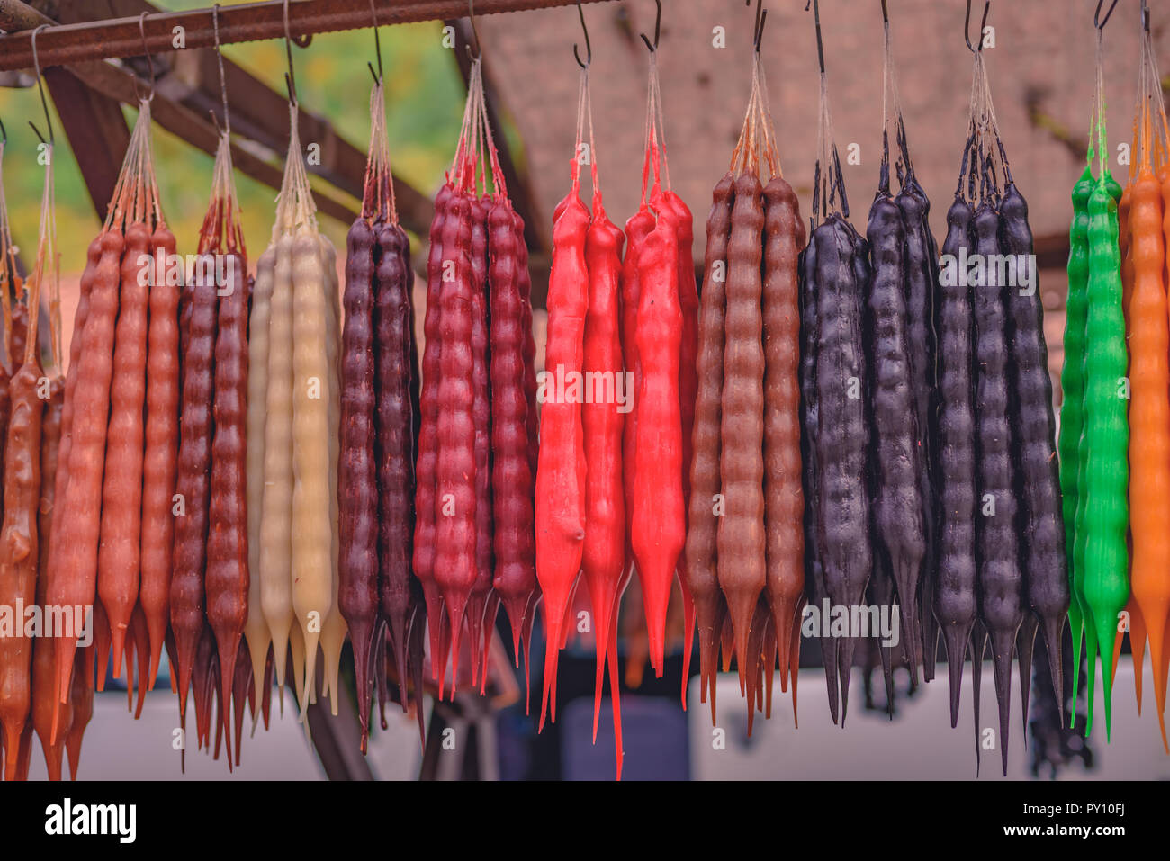 bunches of the bright fresh churchkhela hanging on the market in the ...