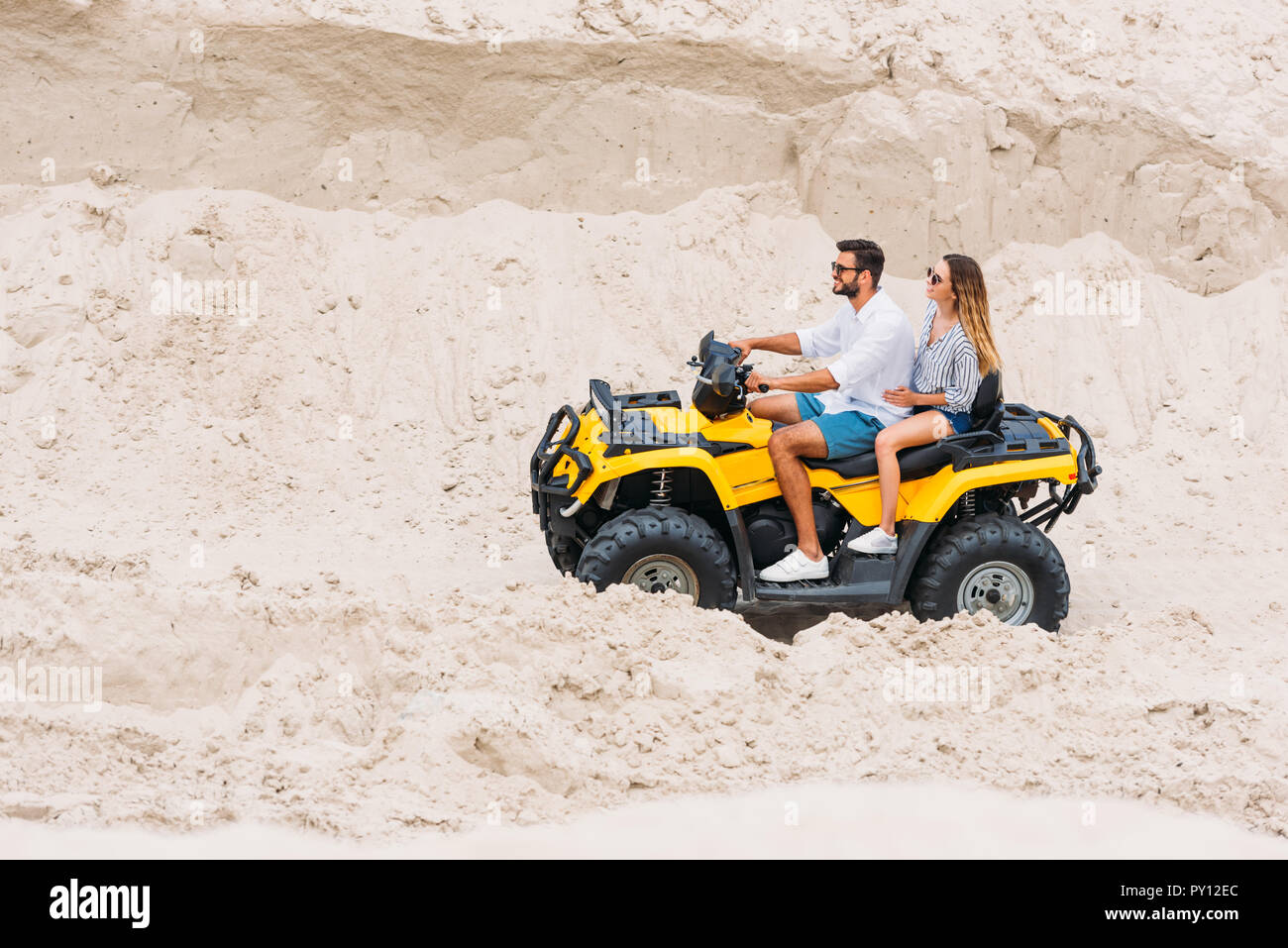 Couple riding four wheeler atv hi-res stock photography and images - Alamy