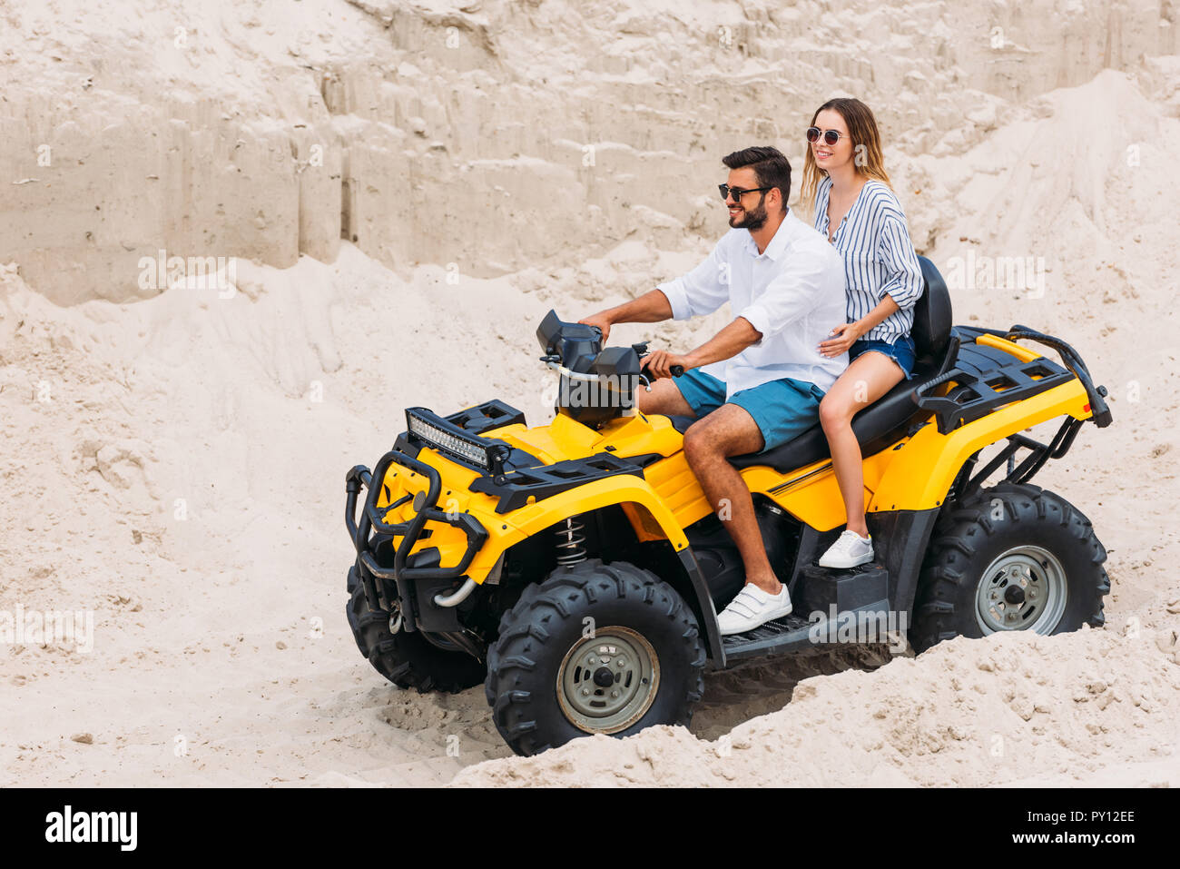 Couple riding four wheeler atv hi-res stock photography and images - Alamy