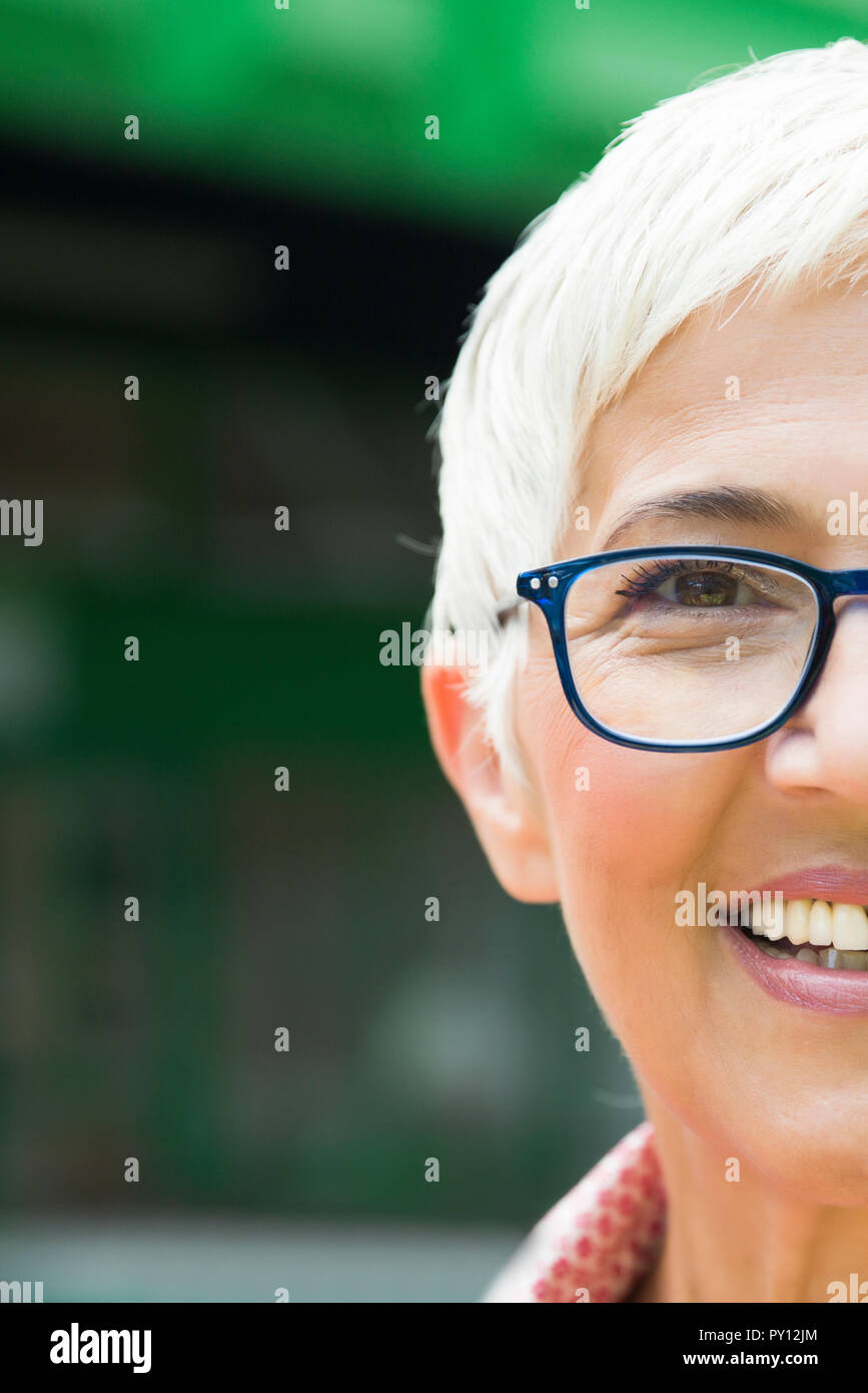 Positive good looking mature hi-res stock photography and images - Alamy