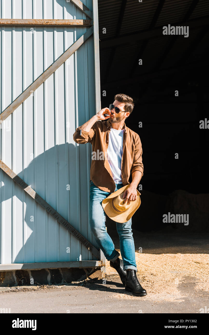 Cowboy smoking cigarette hi-res stock photography and images - Alamy
