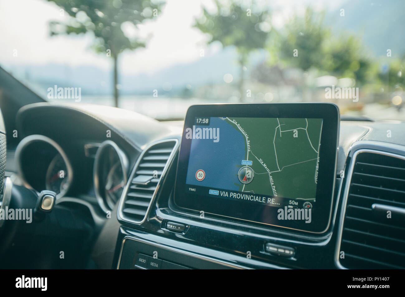 Car navigation display on the car panel Stock Photo - Alamy