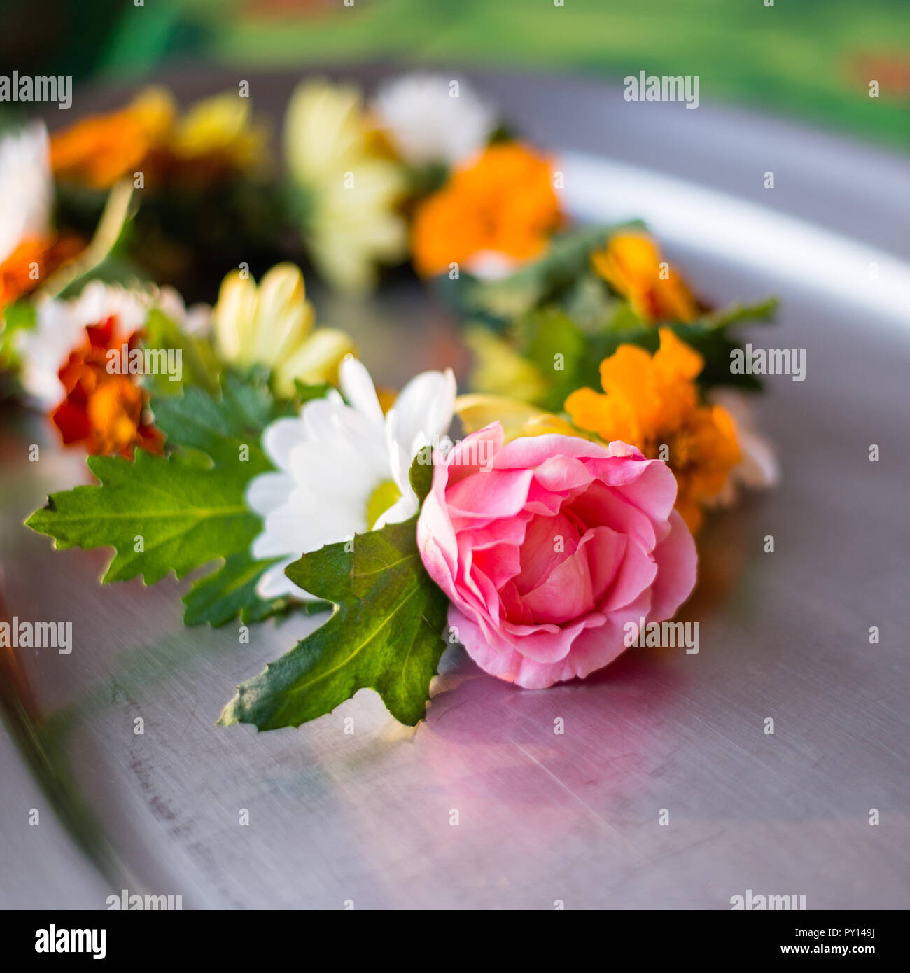 Beautiful necklace of fresh flowers, to be offered to dhuni during the ...